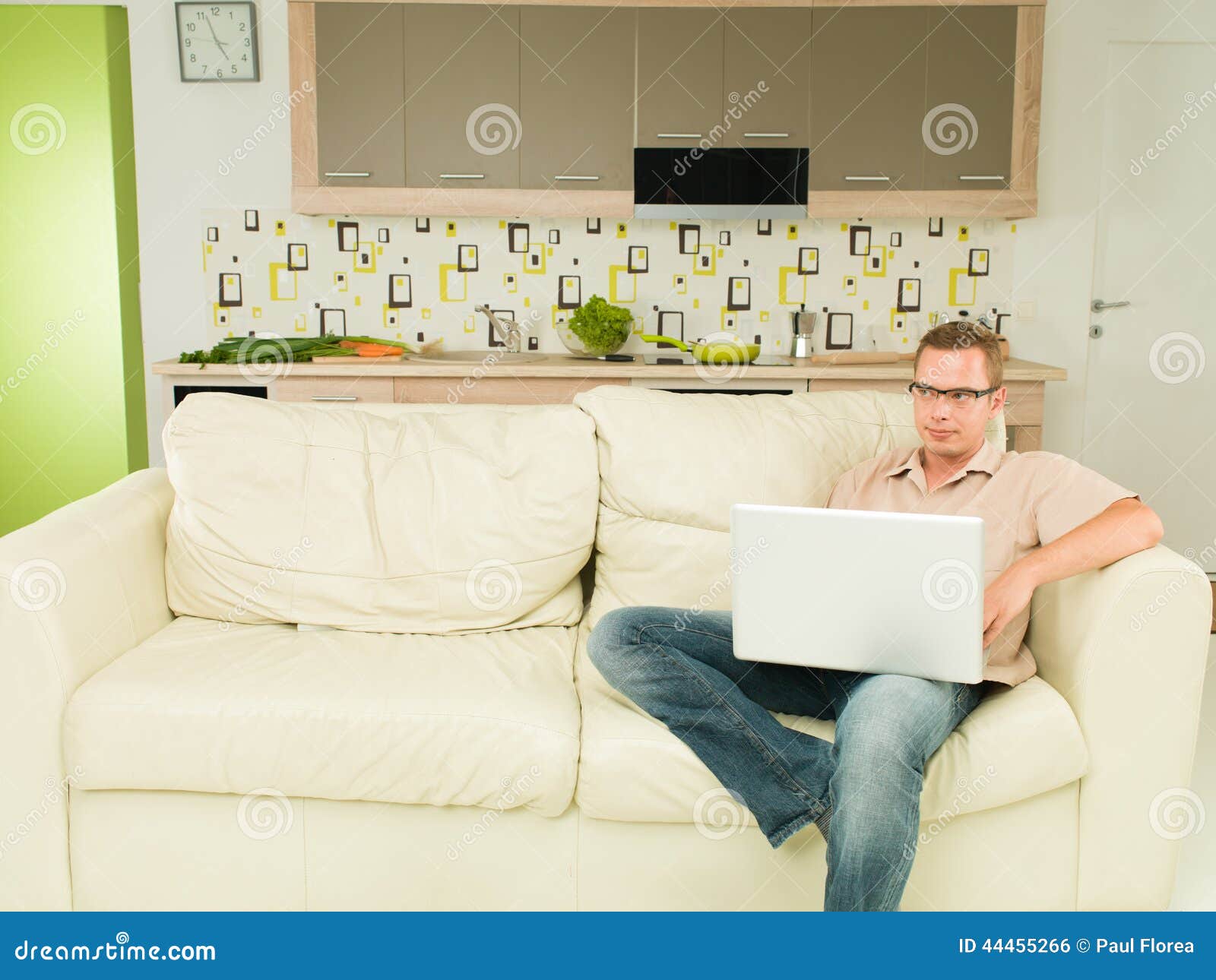 Man Reading Something on Laptop Stock Photo - Image of interior, lying ...