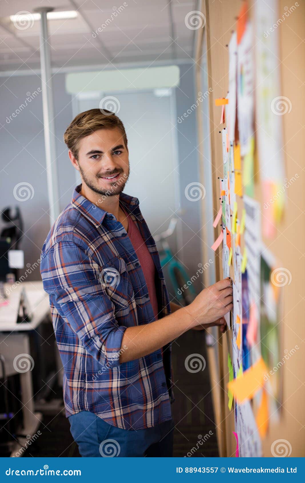 Man Reading Sticky Notes on the Board in Office Stock Image - Image of ...