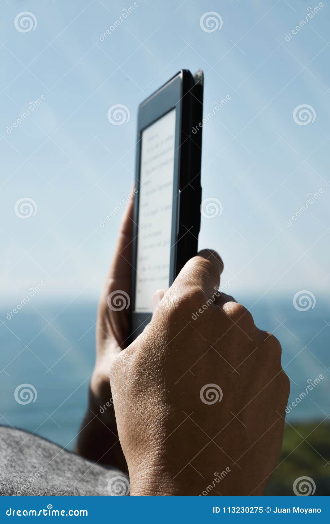 Man Reading in a Tablet or E-reader Stock Image - Image of addiction ...