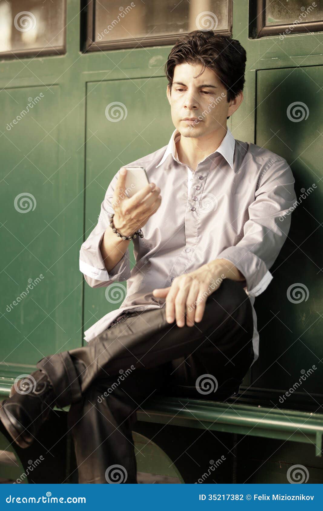 Man reading a text message stock photo. Image of communication - 35217382