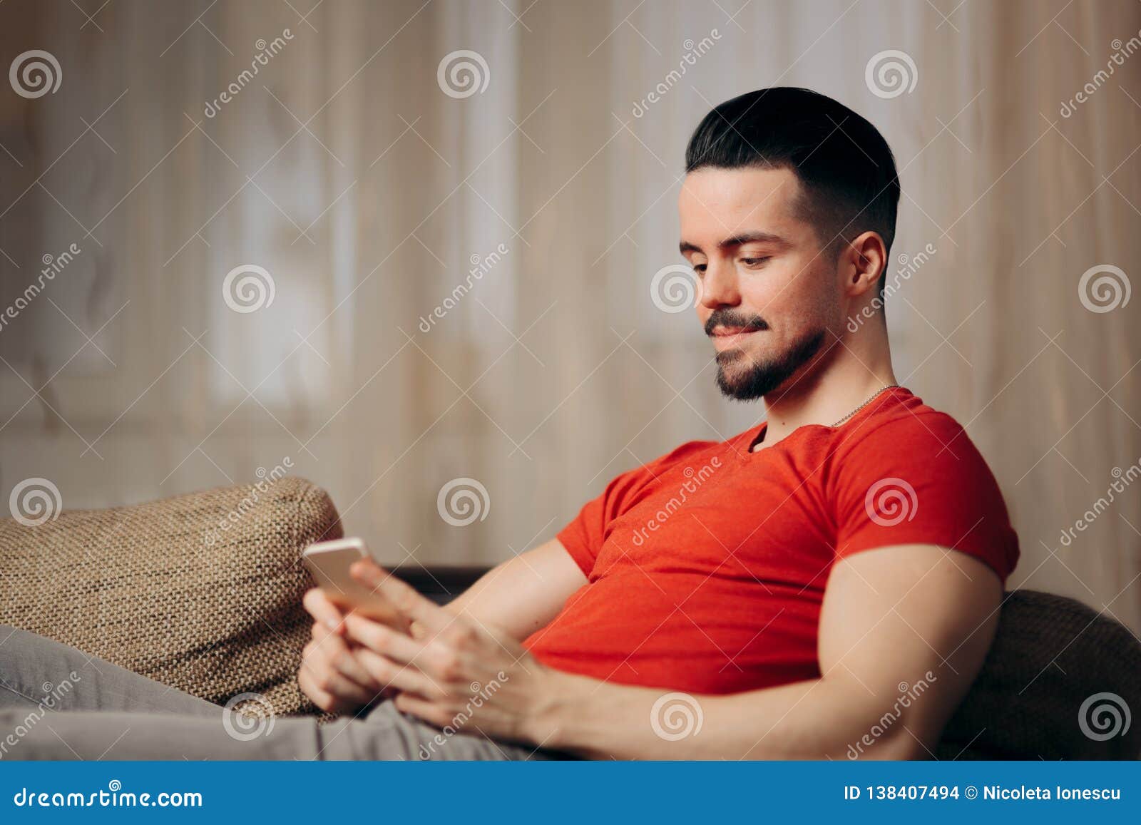 Man Reading Text Messages on His Smartphone Stock Photo - Image of ...