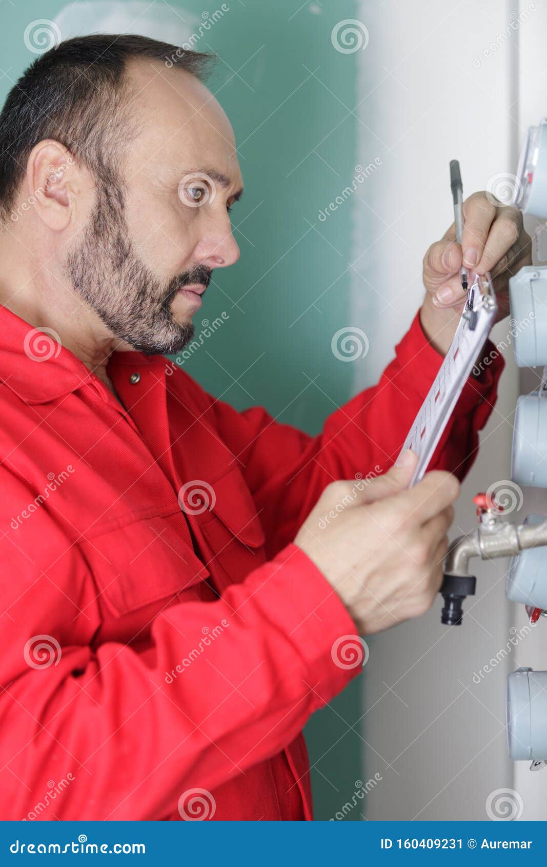 Man reading water meter stock image. Image of engineering - 160409231