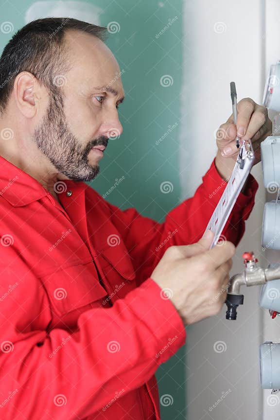 Man reading water meter stock image. Image of engineering - 160409231