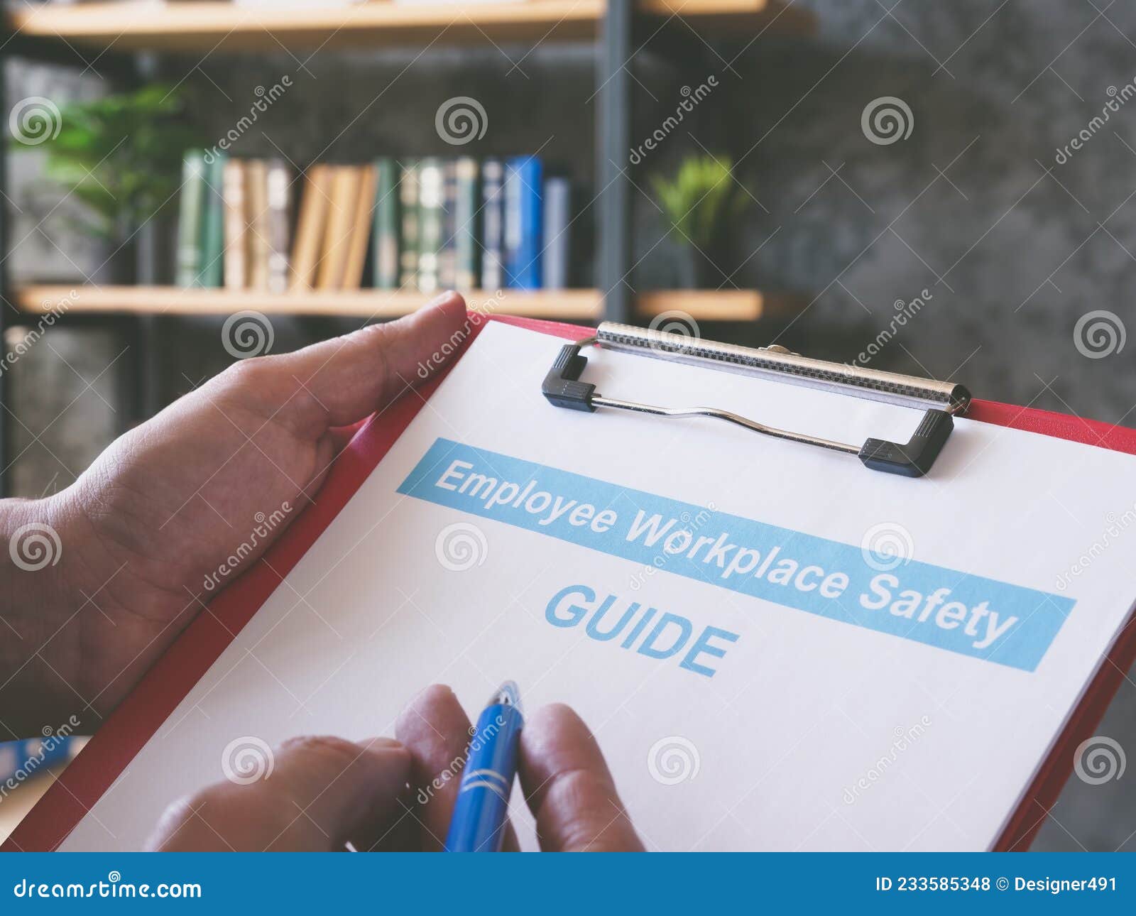 Man Reads Employee Workplace Safety Guide in the Office. Stock Photo ...