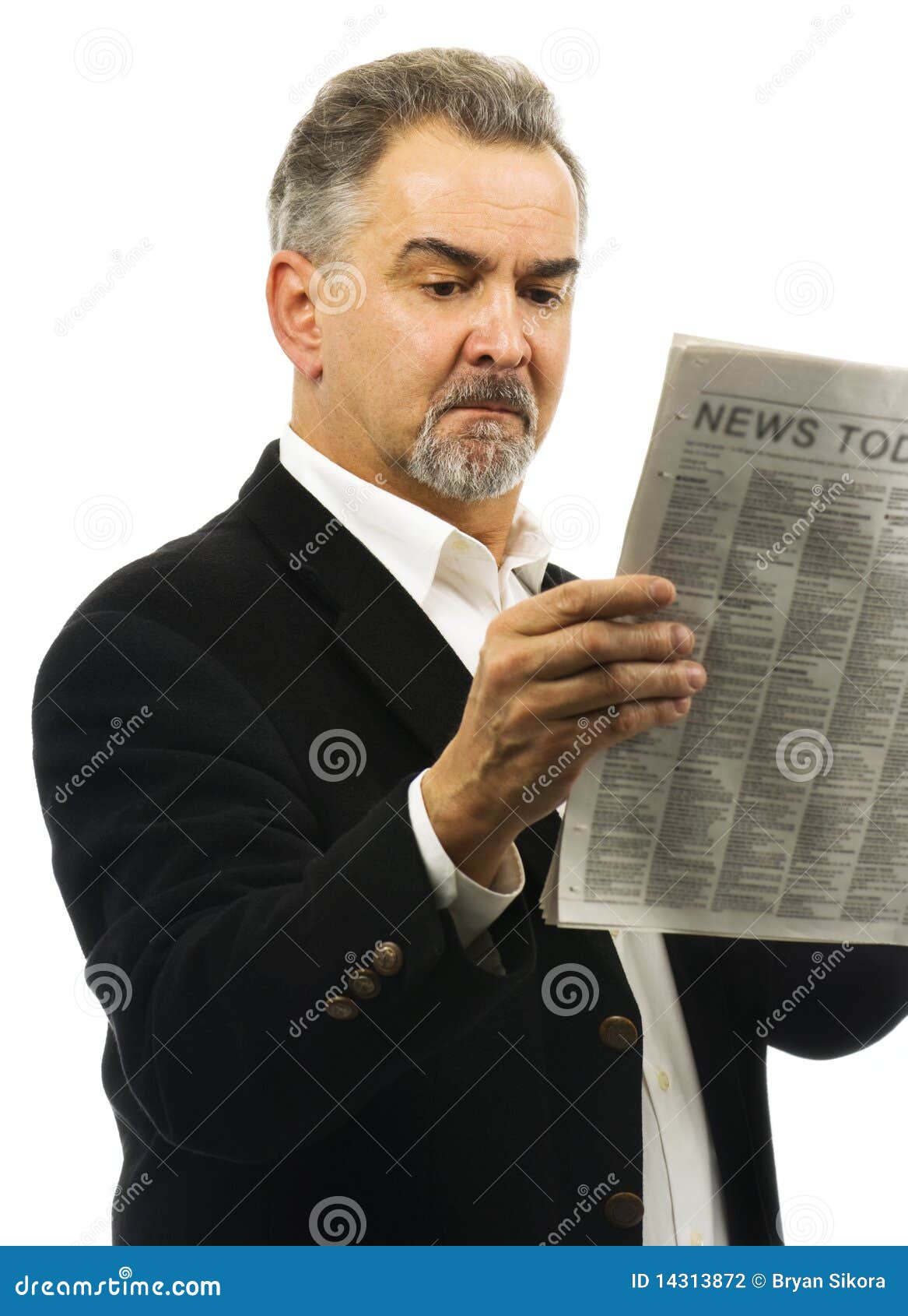 Man Reads Newspaper with Serious Look on Face Stock Photo - Image of ...