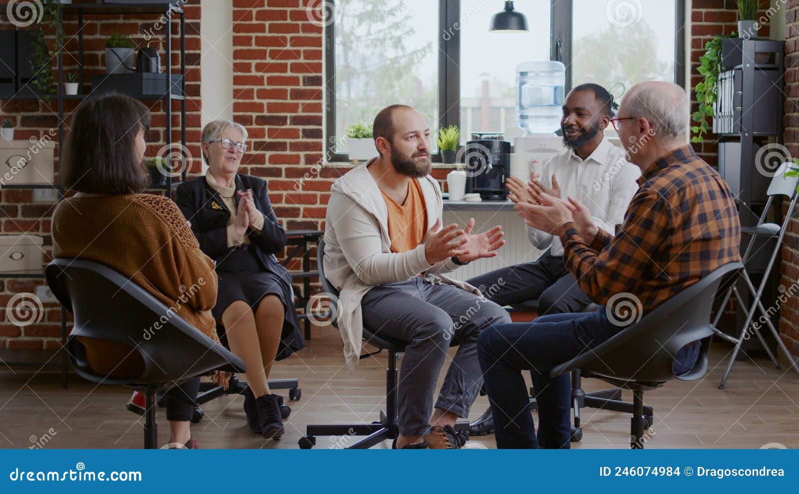 Man Receiving Applause and Congratulations after Sharing Therapy ...