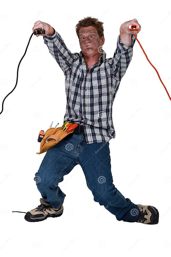Man Receiving Electric Shock Stock Image - Image of male, journeyman ...