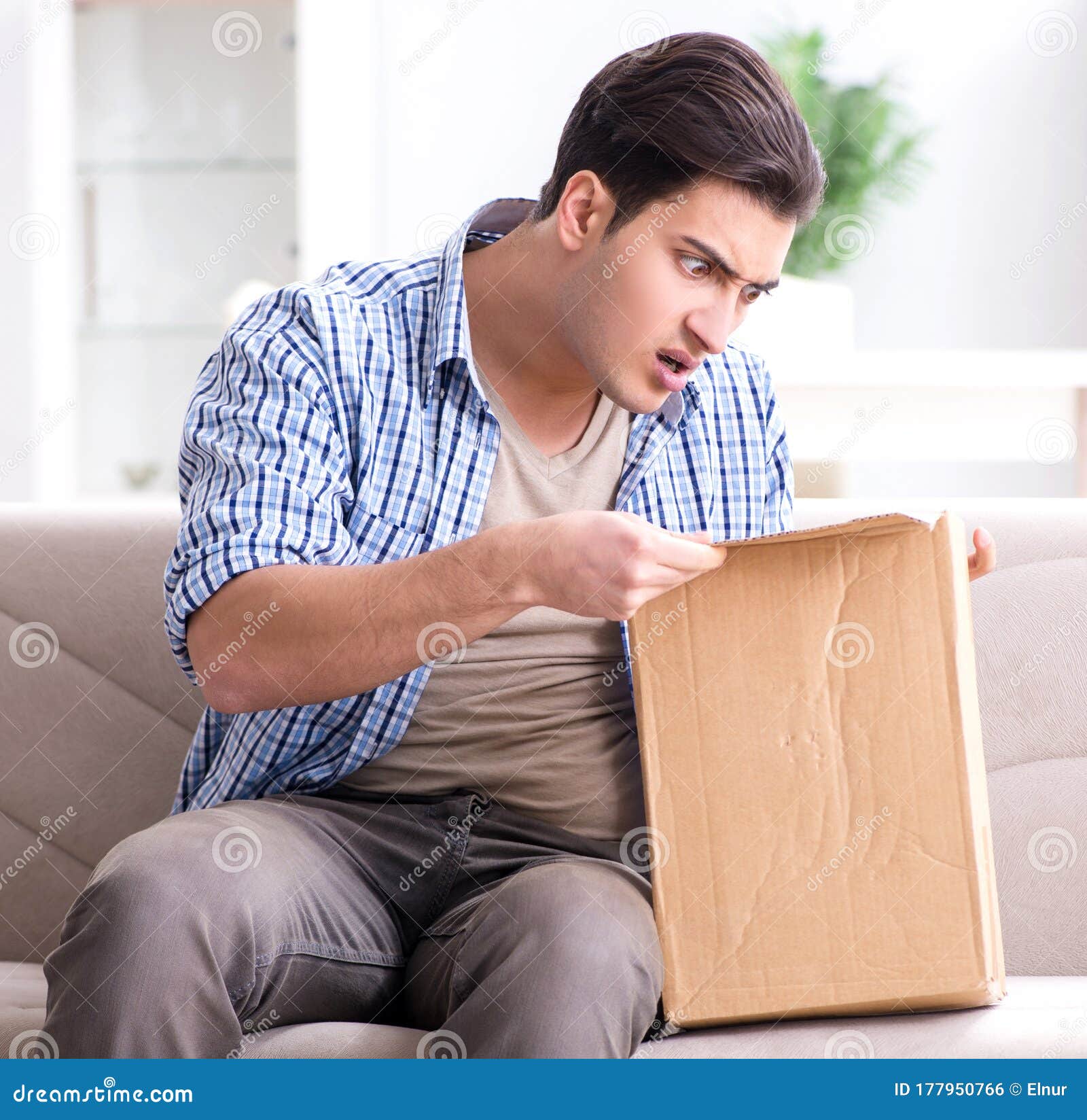 Man Receiving Empty Parcel with Stolen Goods Stock Photo - Image of ...