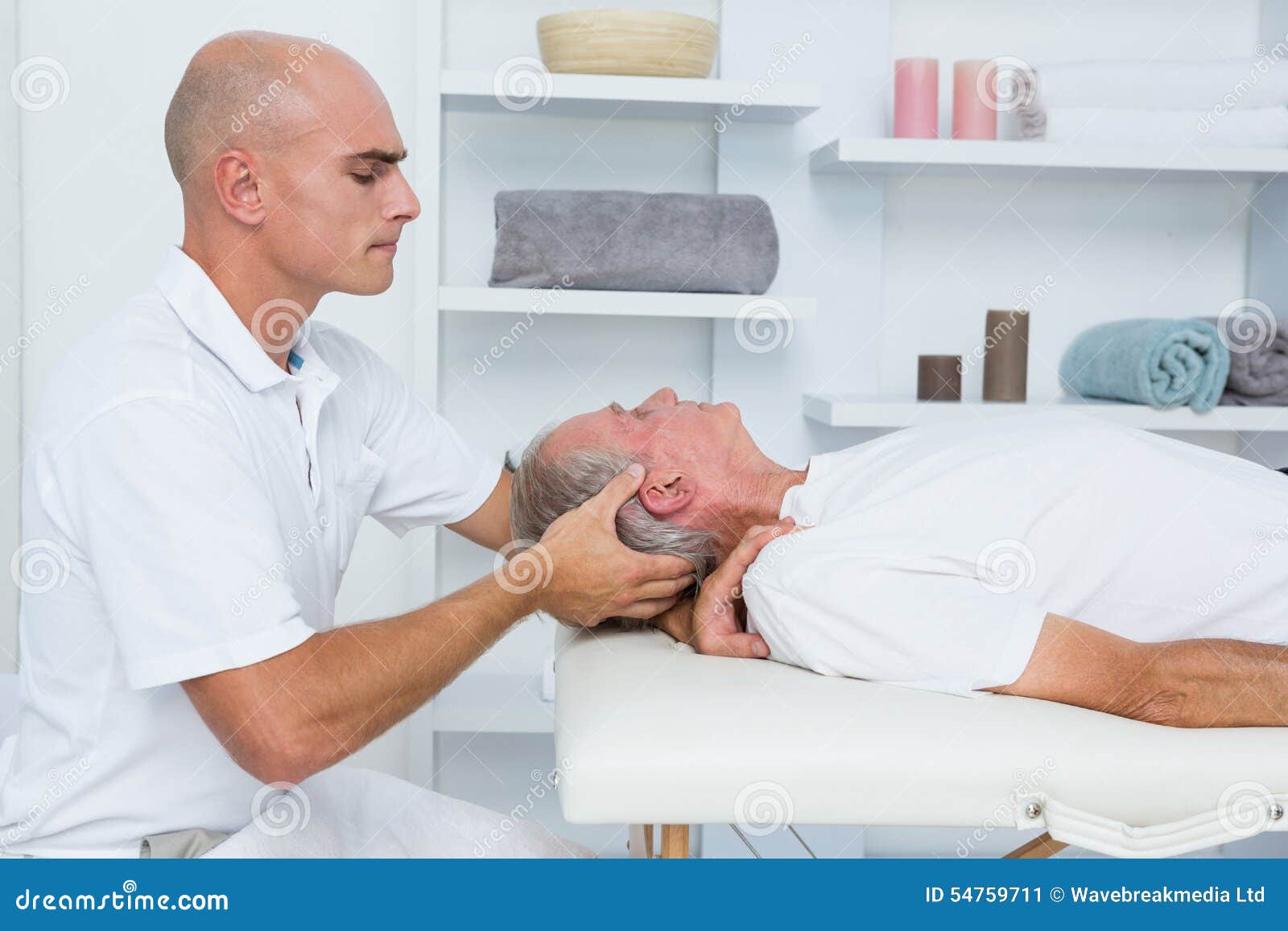 Man receiving head massage stock image. Image of physiotherapy - 54759711