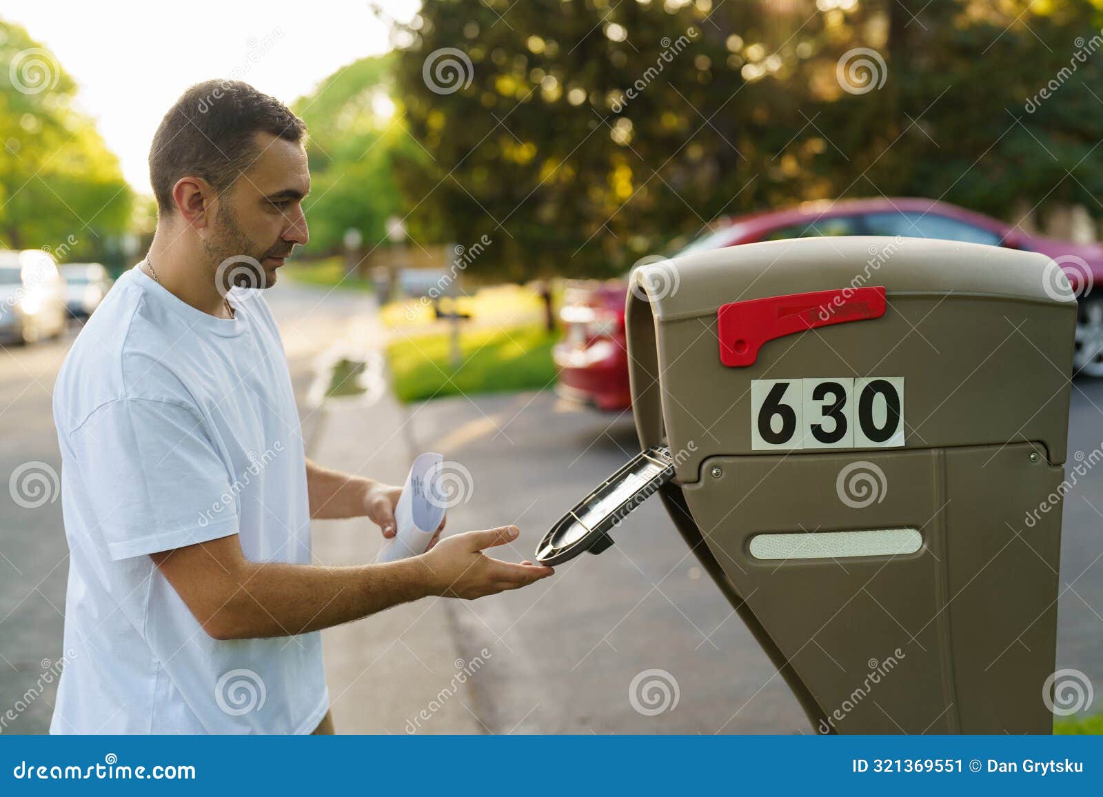 Man Receiving Letters and Bills in Mailbox in Front of House. Mail ...