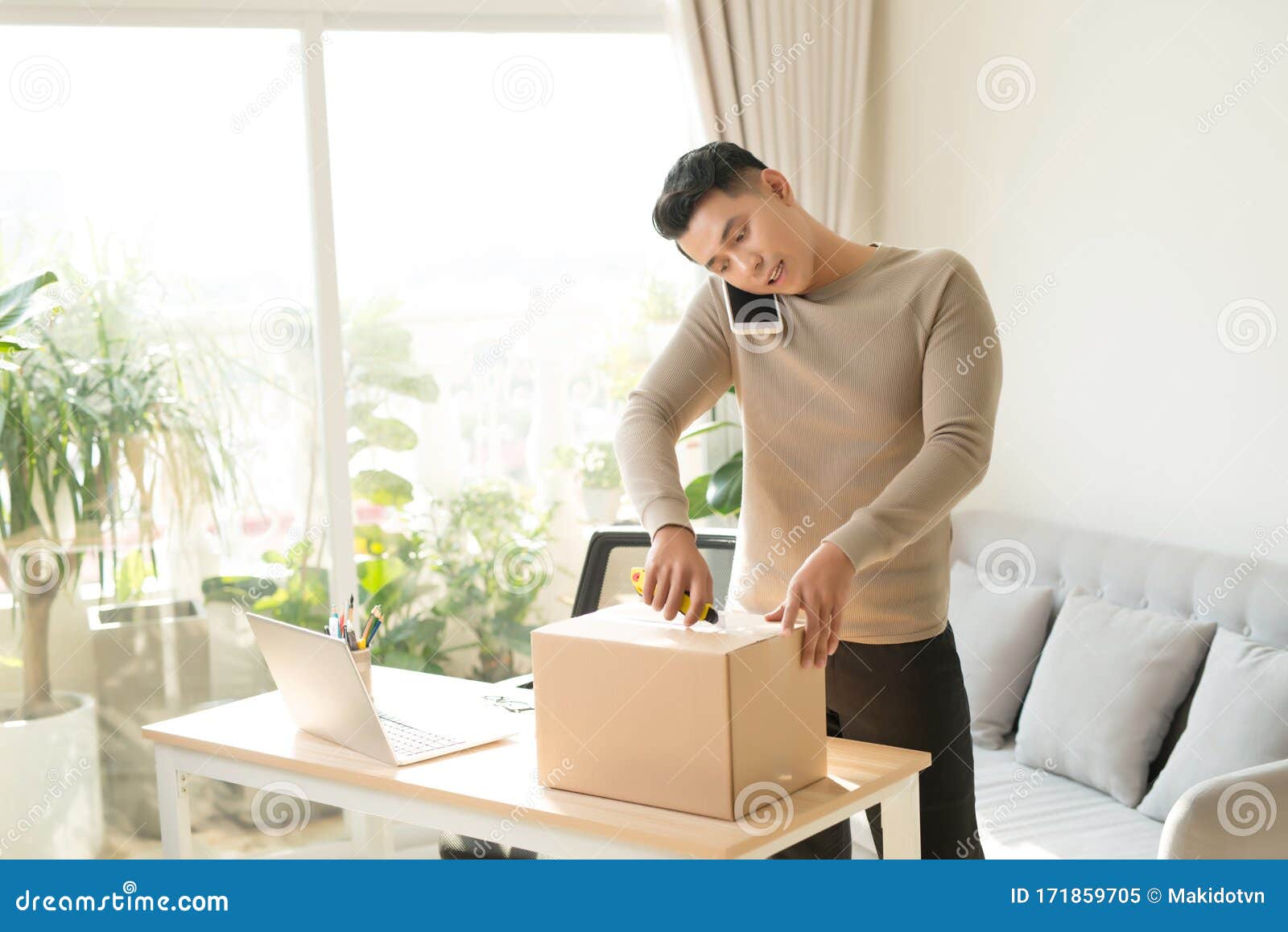 Man Receiving Parcel at Home Stock Image - Image of excited, room ...