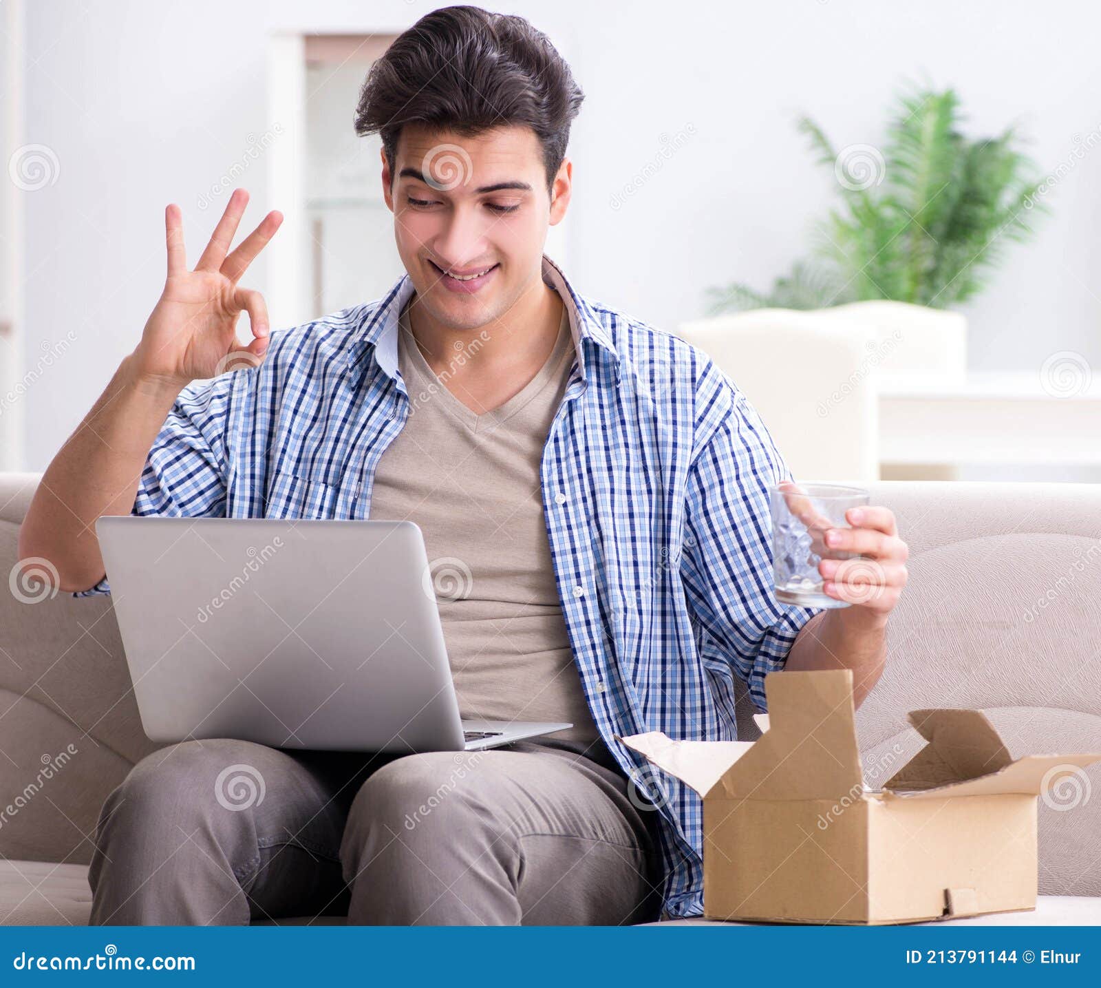 Man Receiving Parcel at Home Stock Photo - Image of laptop, order ...