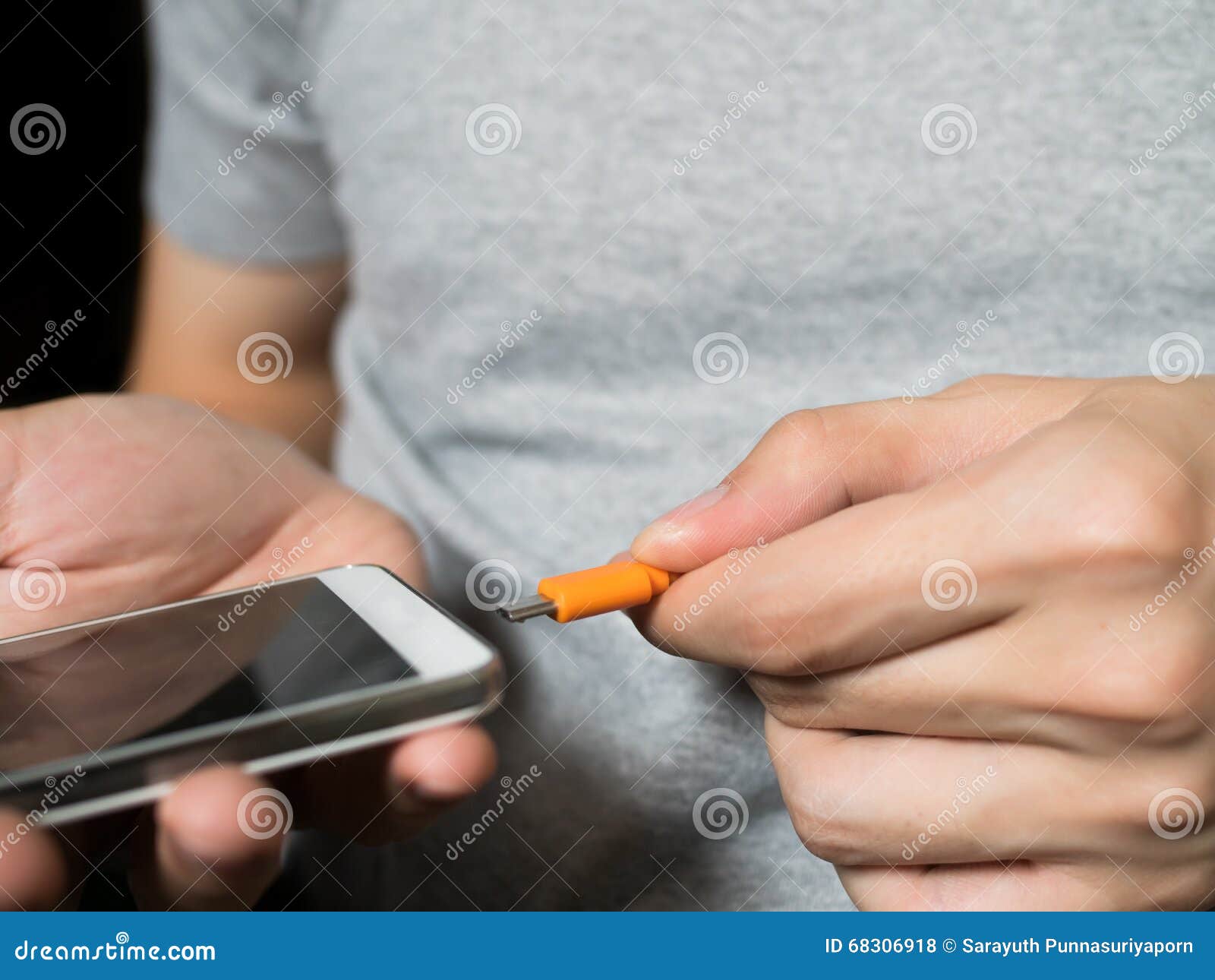 Man Recharing His Cellphone with Power Port Stock Photo - Image of ...