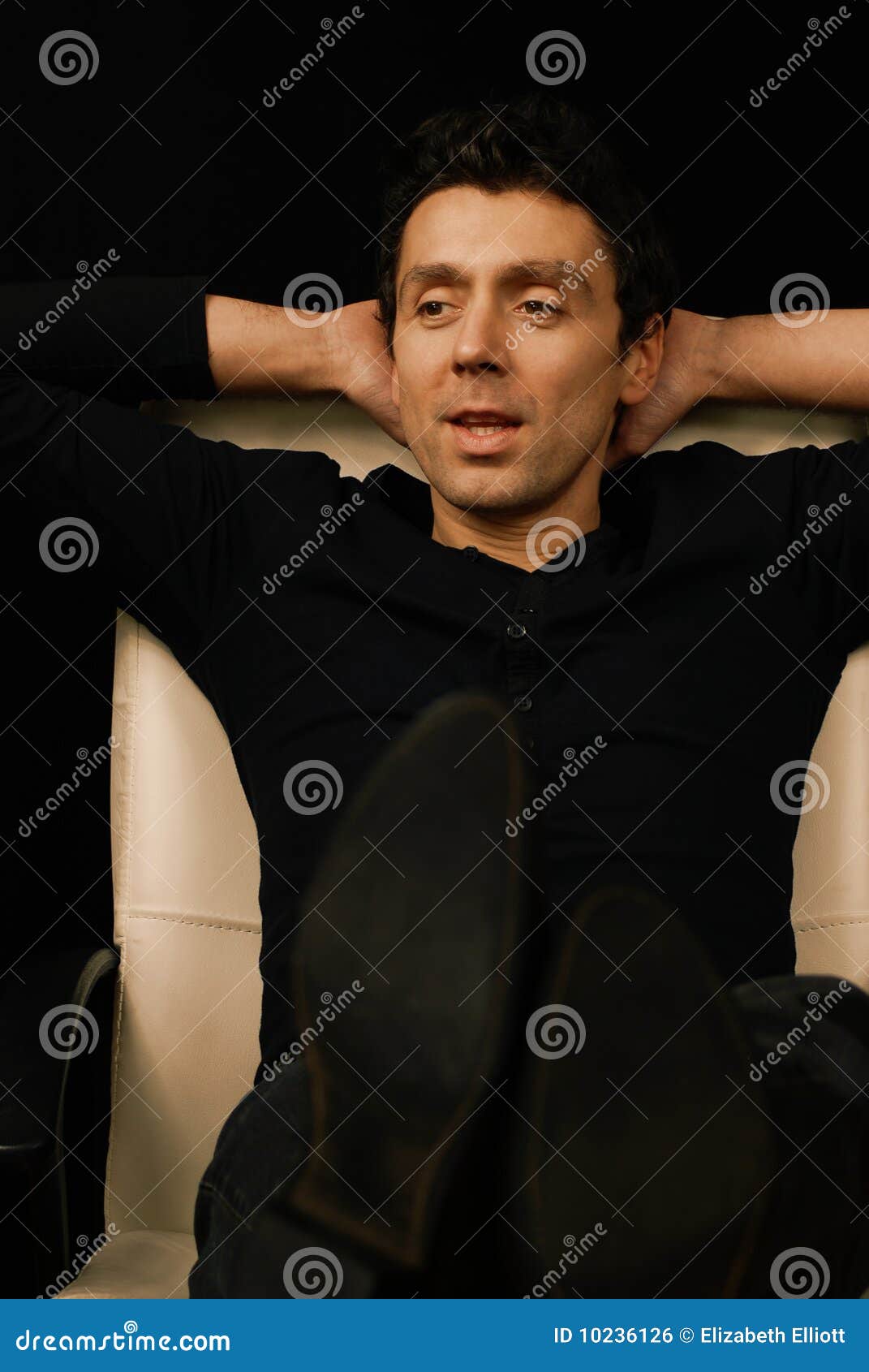 Man Reclines stock photo. Image of brown, chair, feet - 10236126