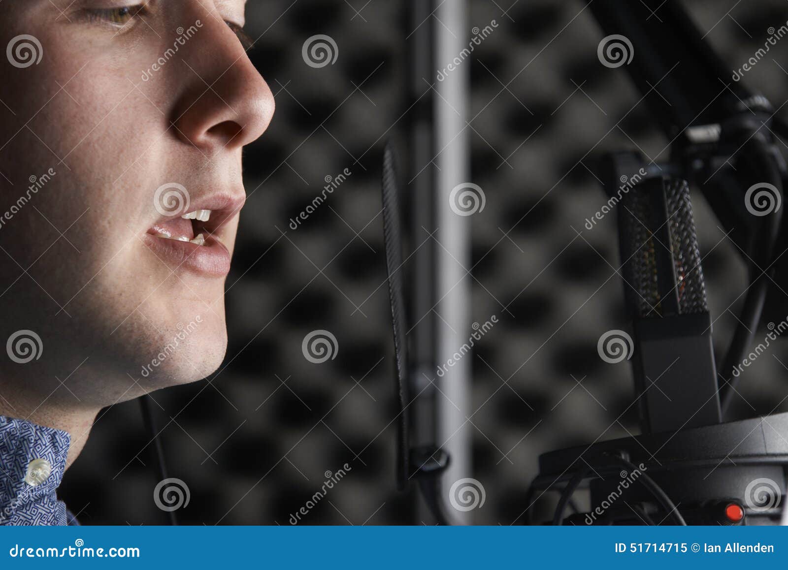 Man in Recording Studio Talking into Microphone Stock Image - Image of ...