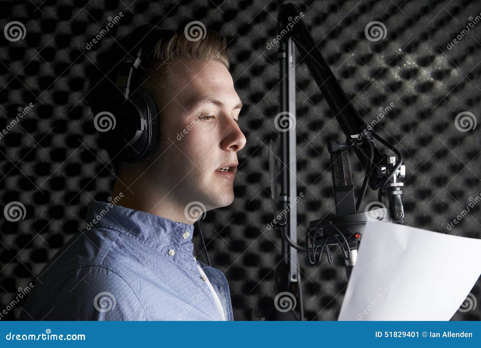 Man in Recording Studio Talking into Microphone Stock Image - Image of ...