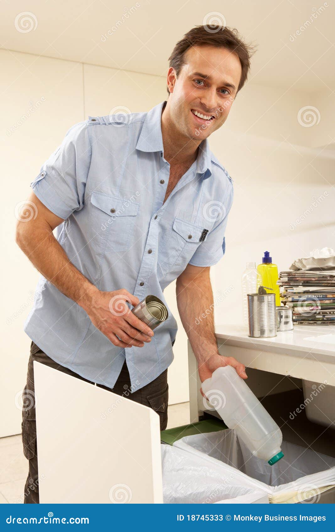 Man Recyling Waste at Home stock image. Image of camera - 18745333