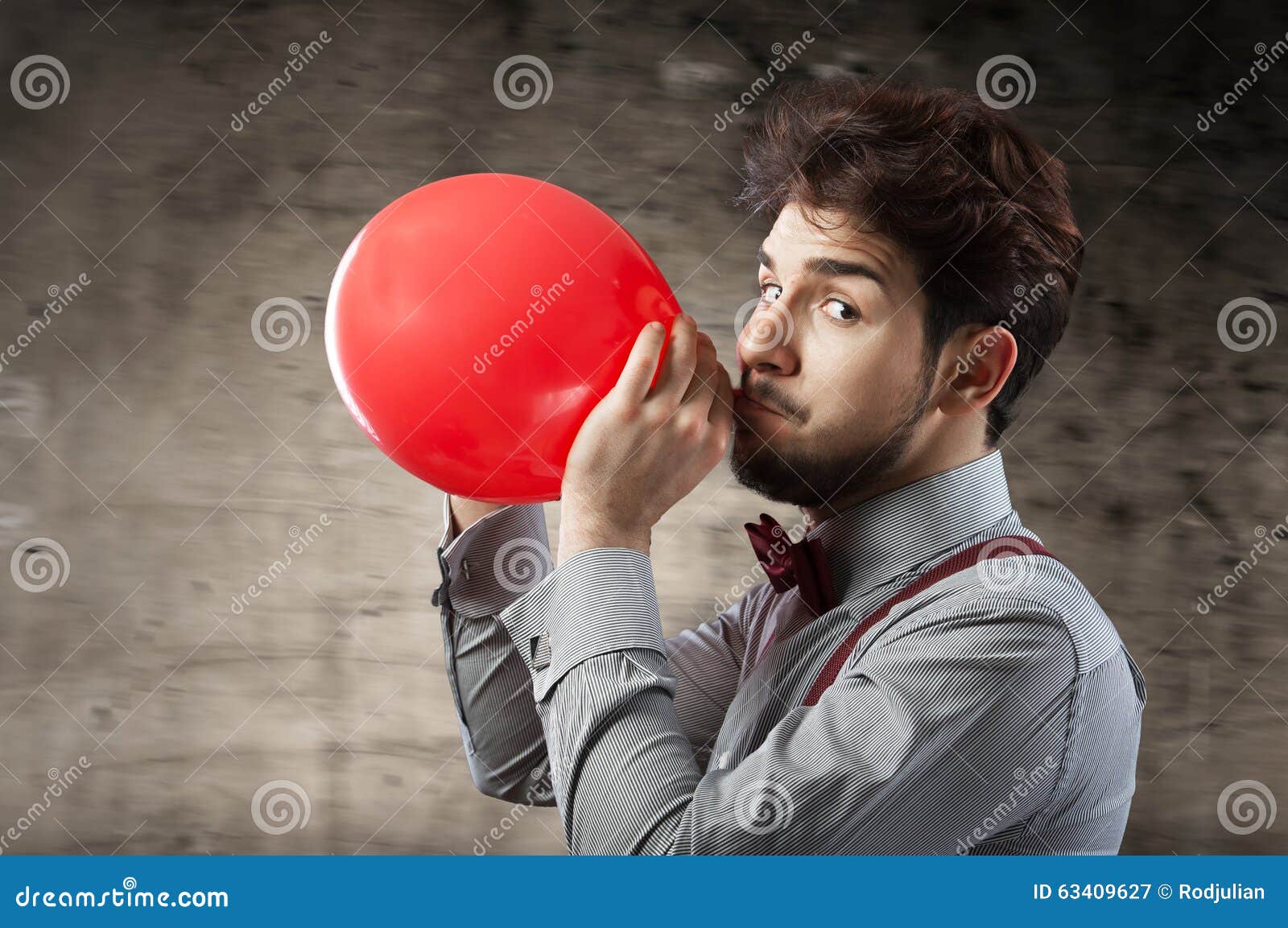 Man with a red balloon stock image. Image of holiday - 63409627