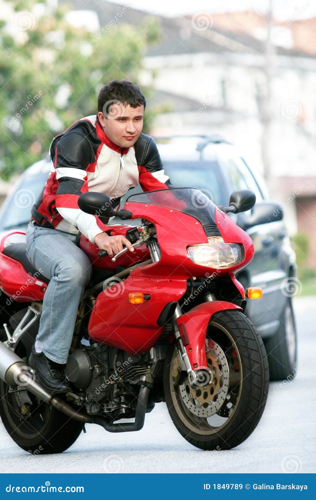 Man on a red bike stock image. Image of motorbike, cruiser - 1849789