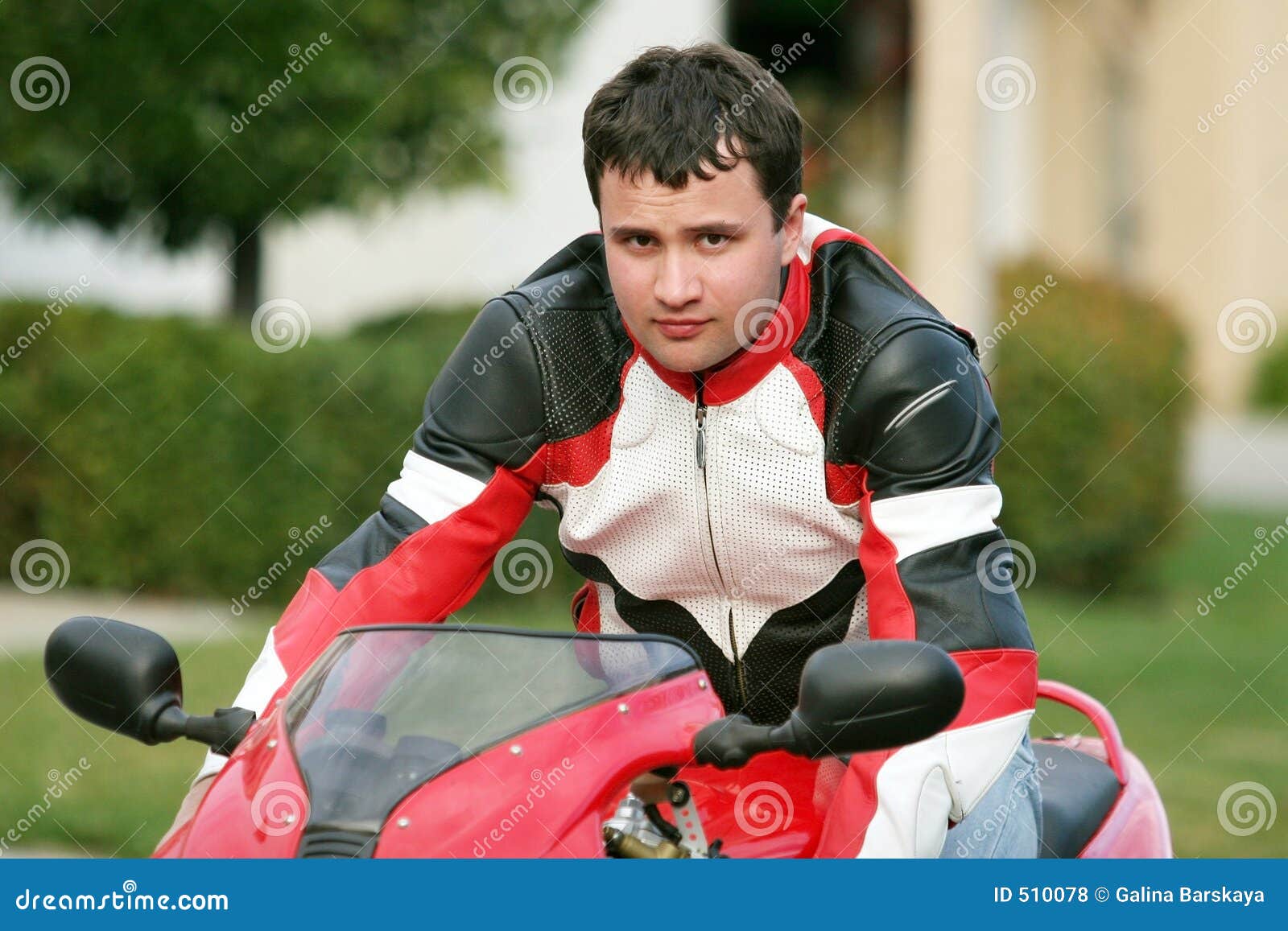 Man on a red bike stock photo. Image of details, driver - 510078