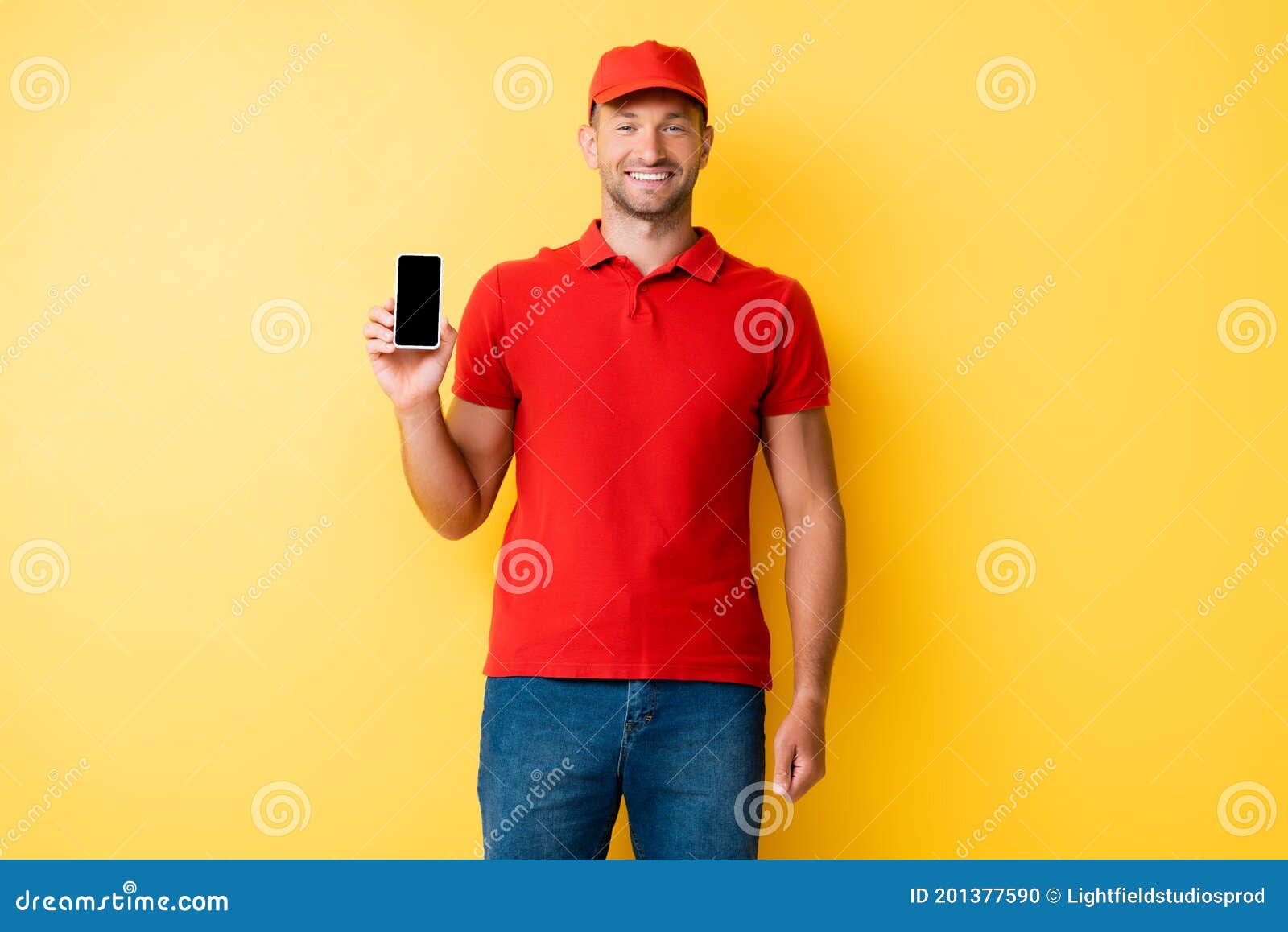 Man in Red Cap Holding Smartphone Stock Photo - Image of cheerful ...