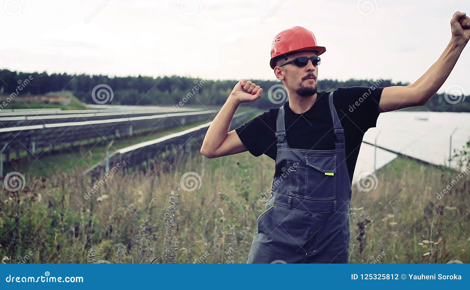 Engineer on a Background of Solar Cells Dancing Stock Footage - Video ...
