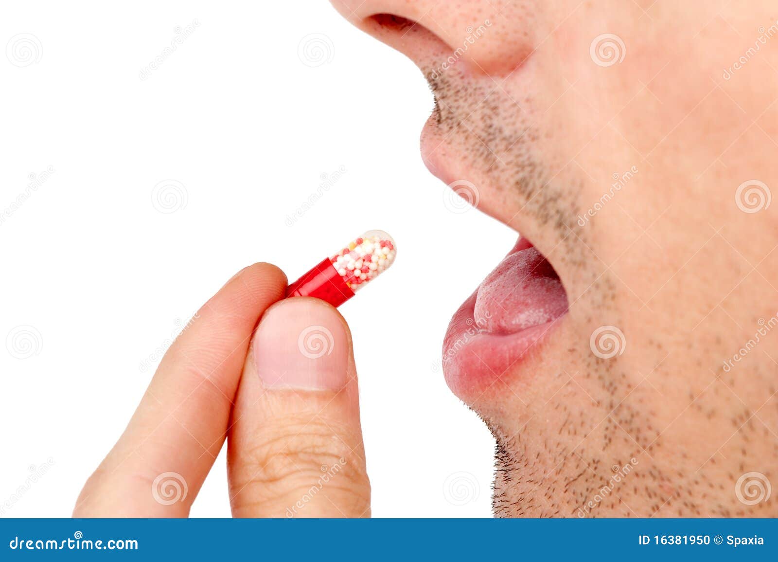 Man with red pill closeup stock photo. Image of care - 16381950