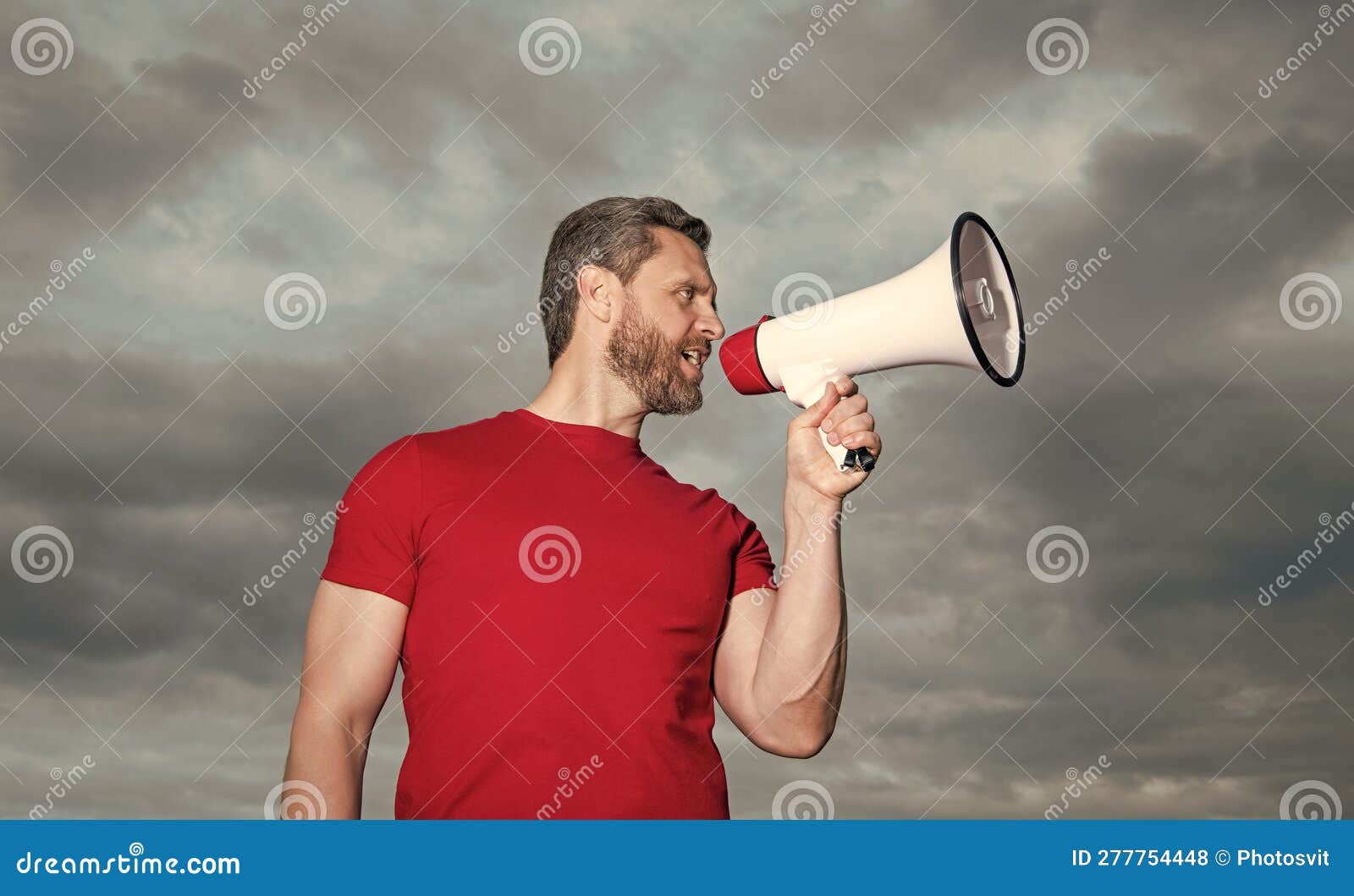 Man in Red Shirt Announcing in Loudspeaker on Sky Background Stock ...