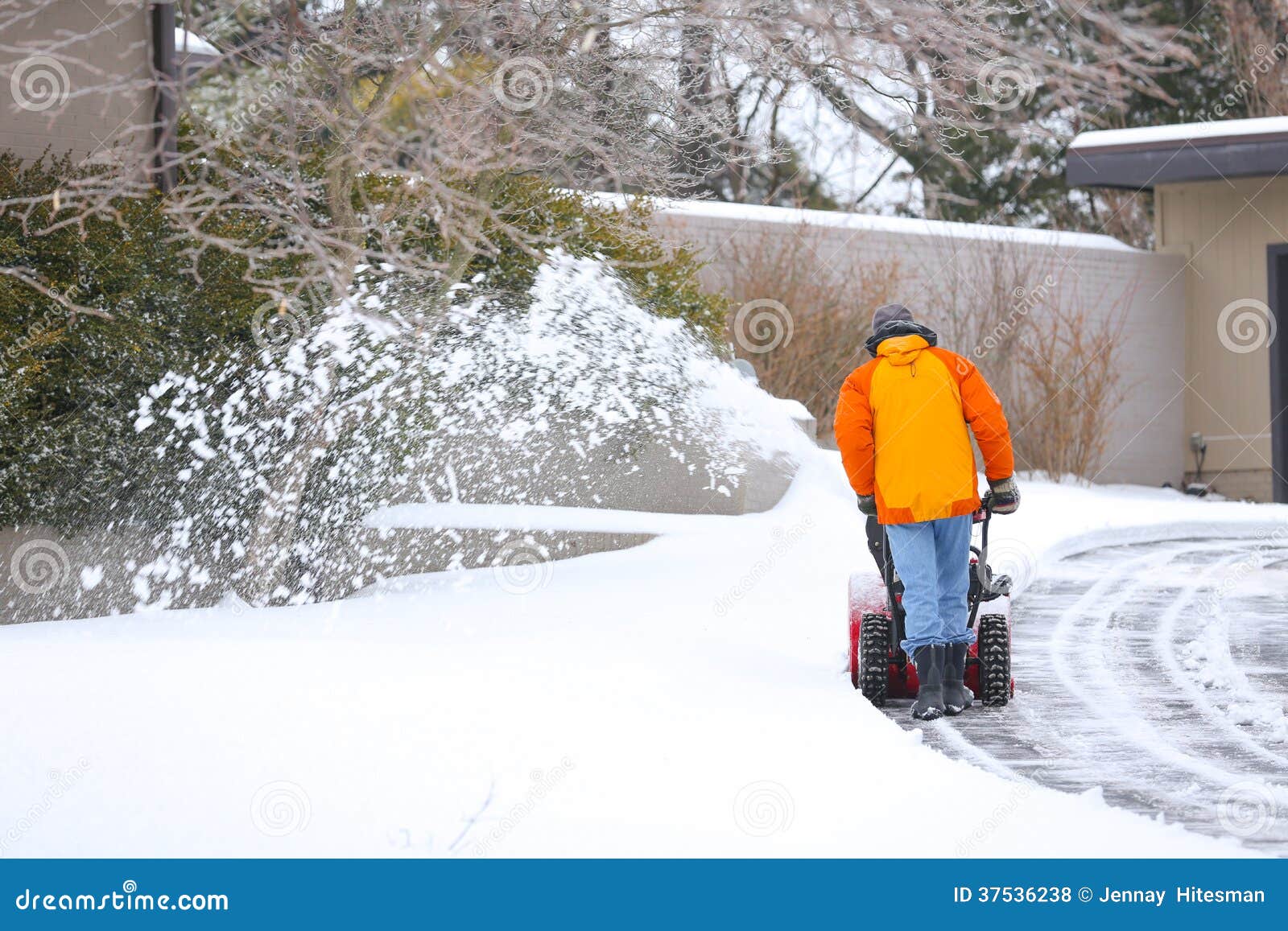 Man with Red Snow Blower stock photo. Image of engine - 37536238