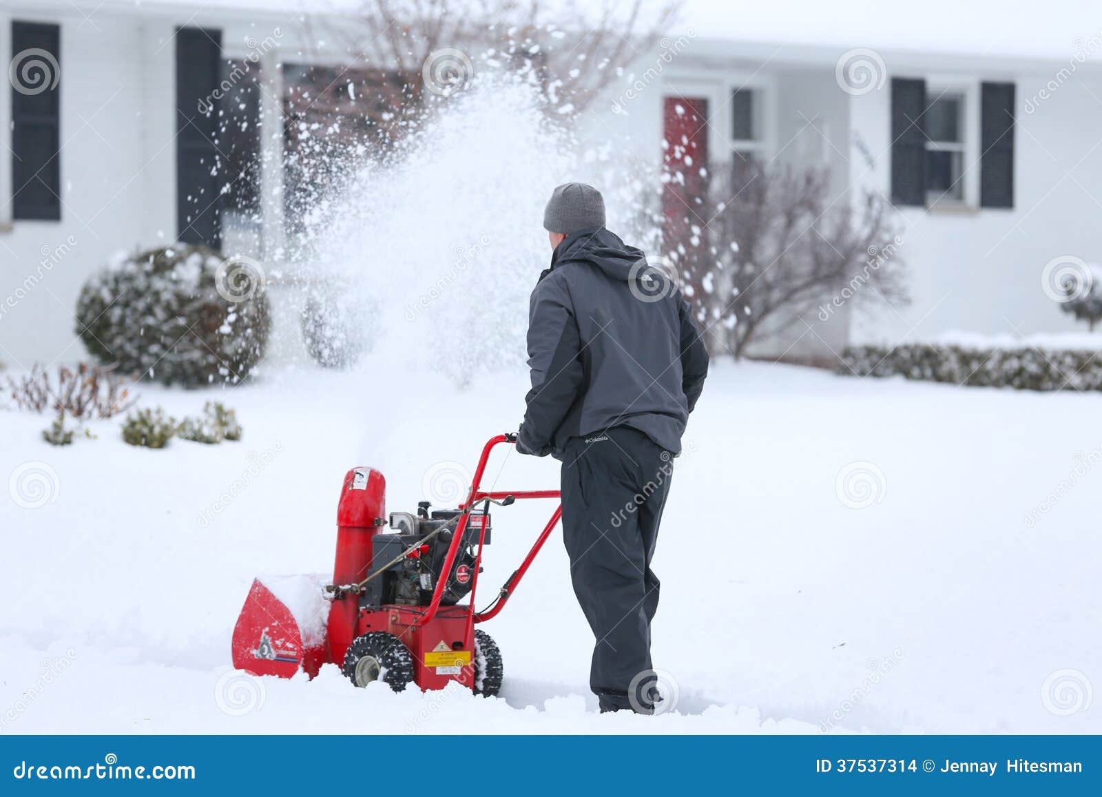 Man with Red Snow Blower editorial stock image. Image of small - 37537314