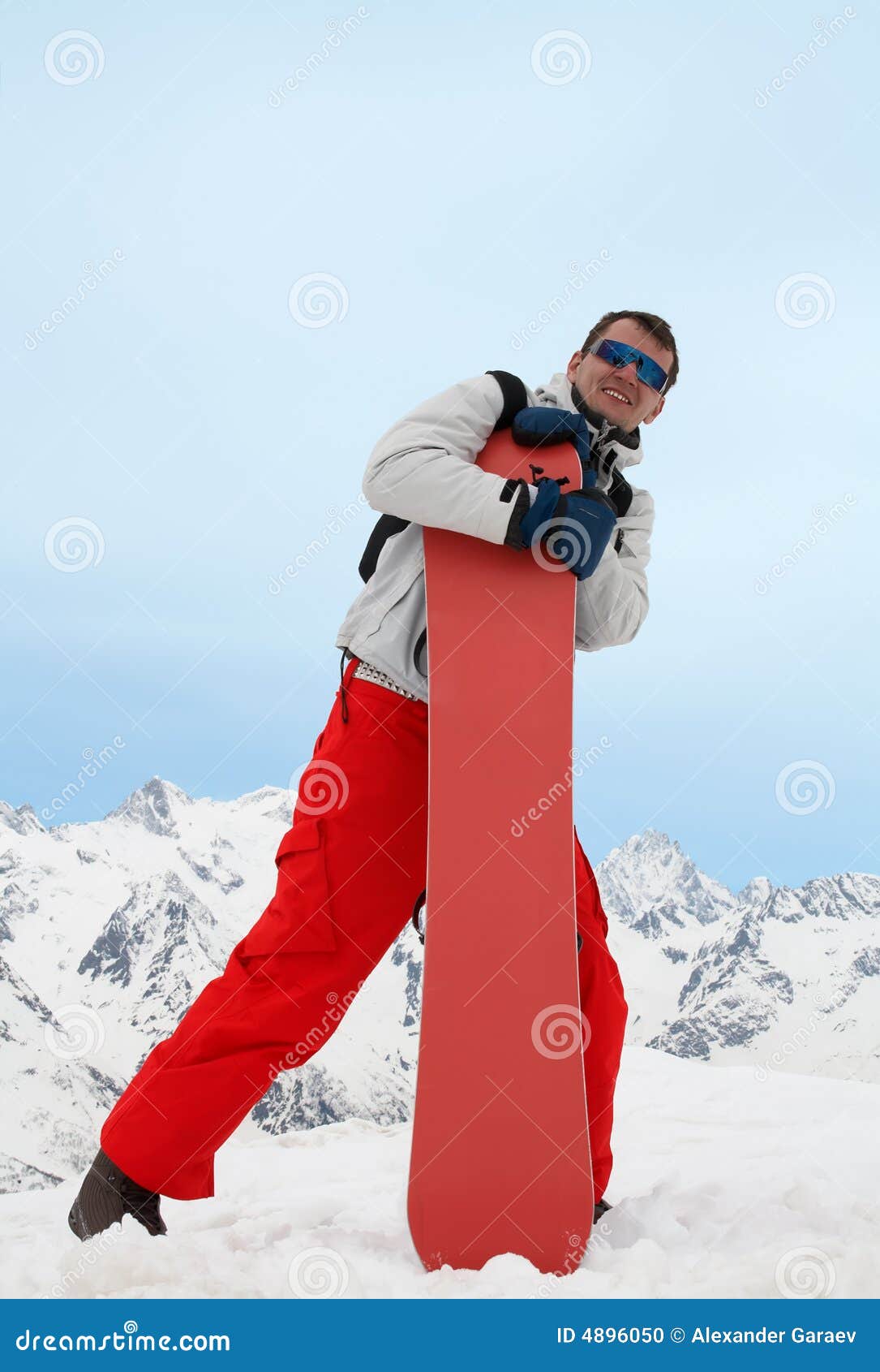 Man with red snowboard stock photo. Image of active, action - 4896050
