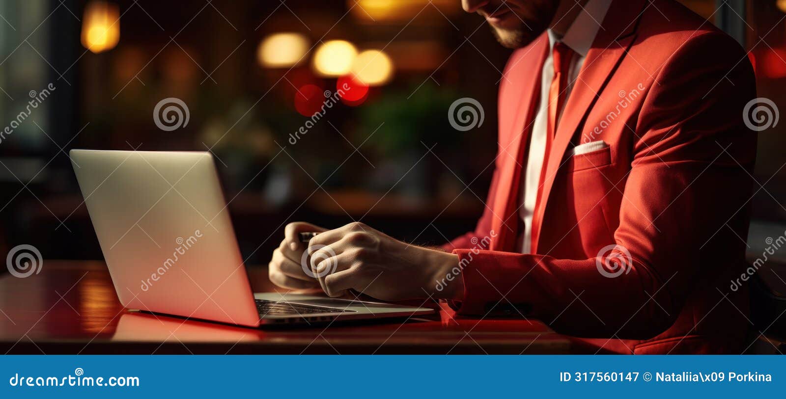 Man in Red Suit Working on Laptop. Professional Businessman in Red ...