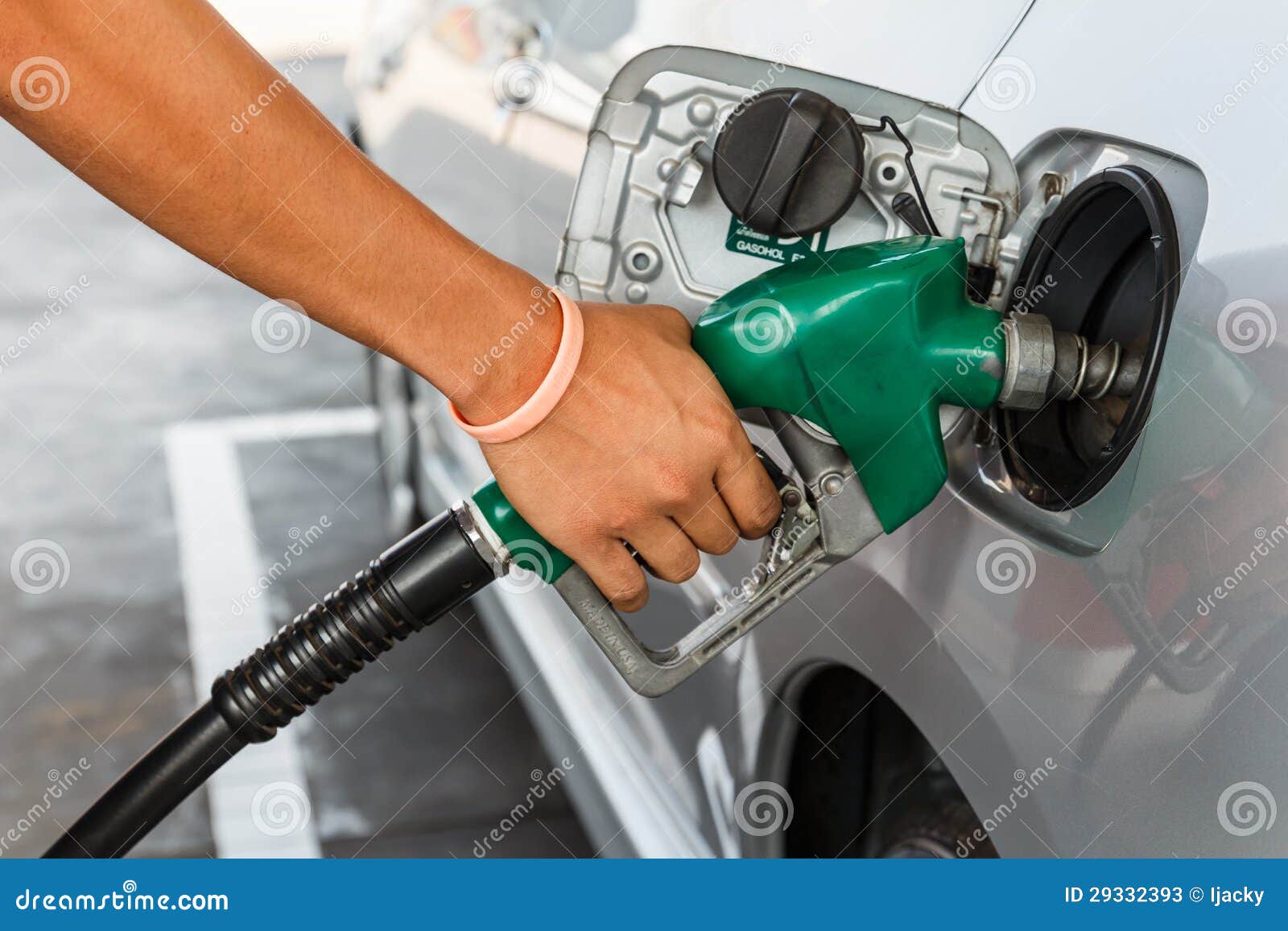 Man Refilling the Car with Fuel on a Filling Stati Stock Image - Image ...