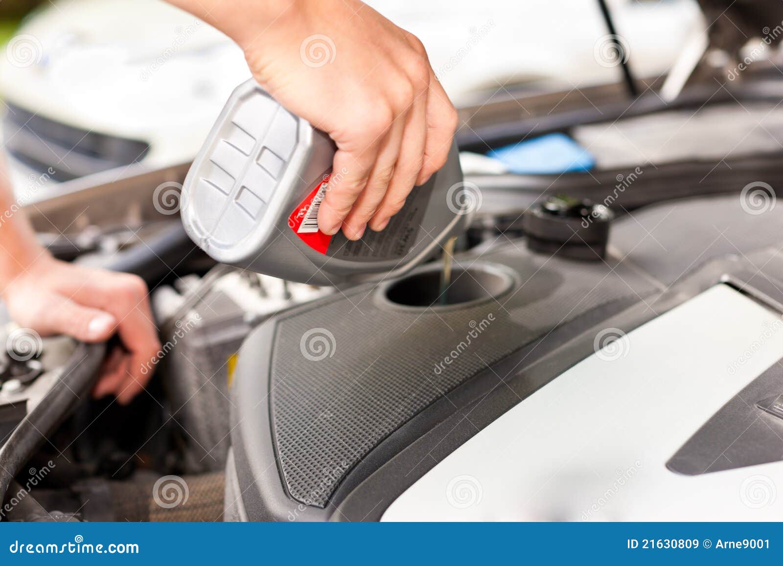 Man is Refilling Oil in His Car Stock Image - Image of garage, people ...