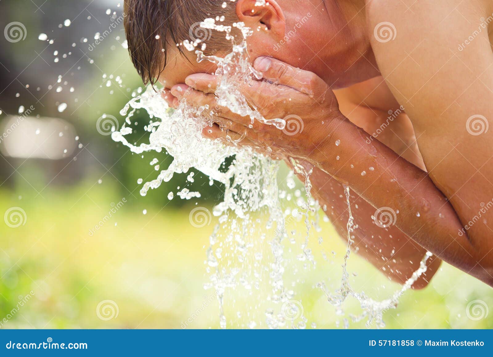 A Man Refreshes Himself with a Splash of Water Stock Photo - Image of ...