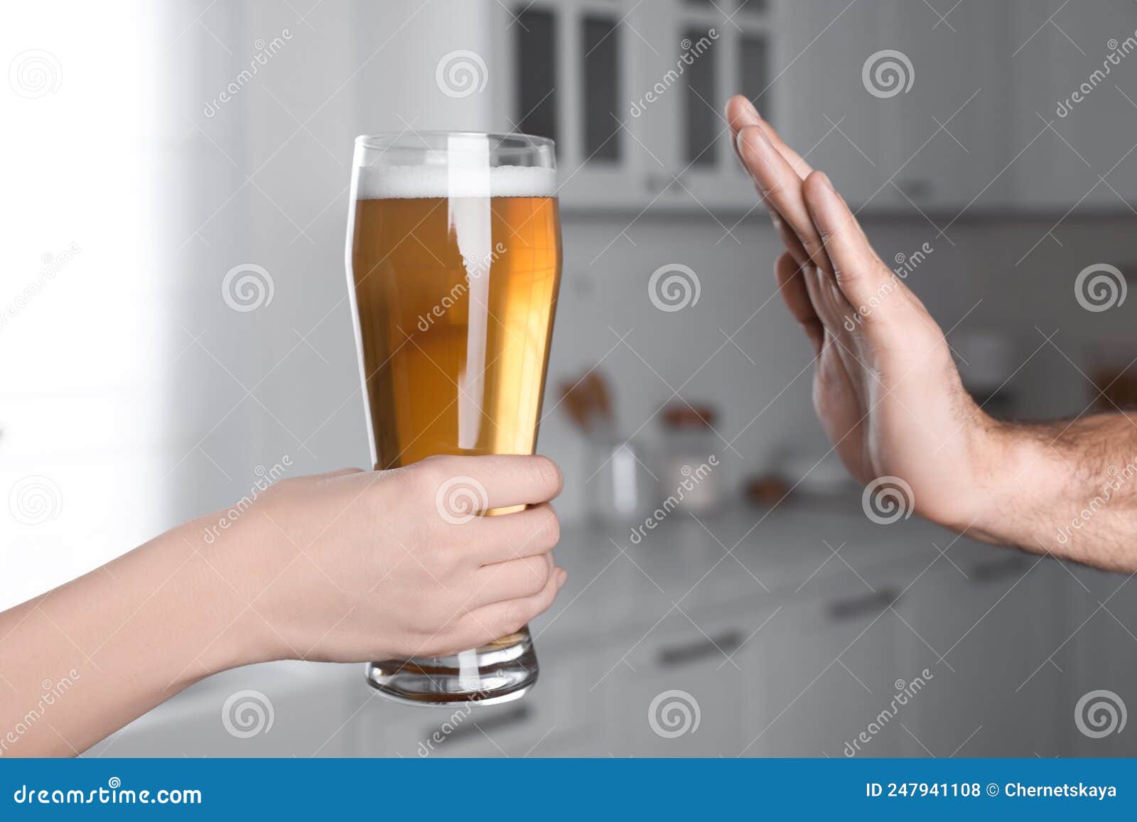 Man Refusing To Drink Beer in Kitchen, Closeup. Alcohol Addiction ...