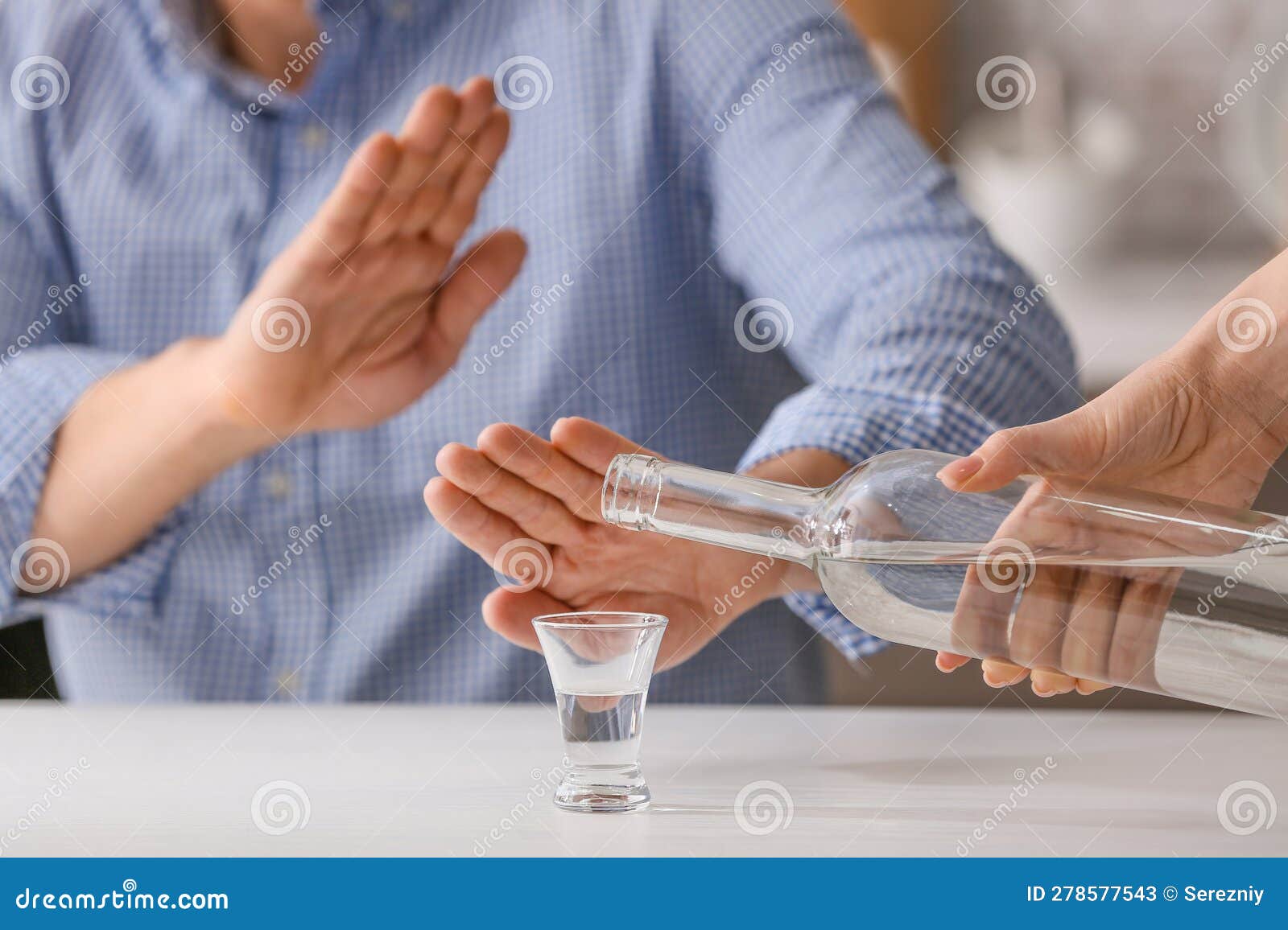 Man Refusing To Drink Vodka at Home. Concept of Alcoholism Stock Image ...