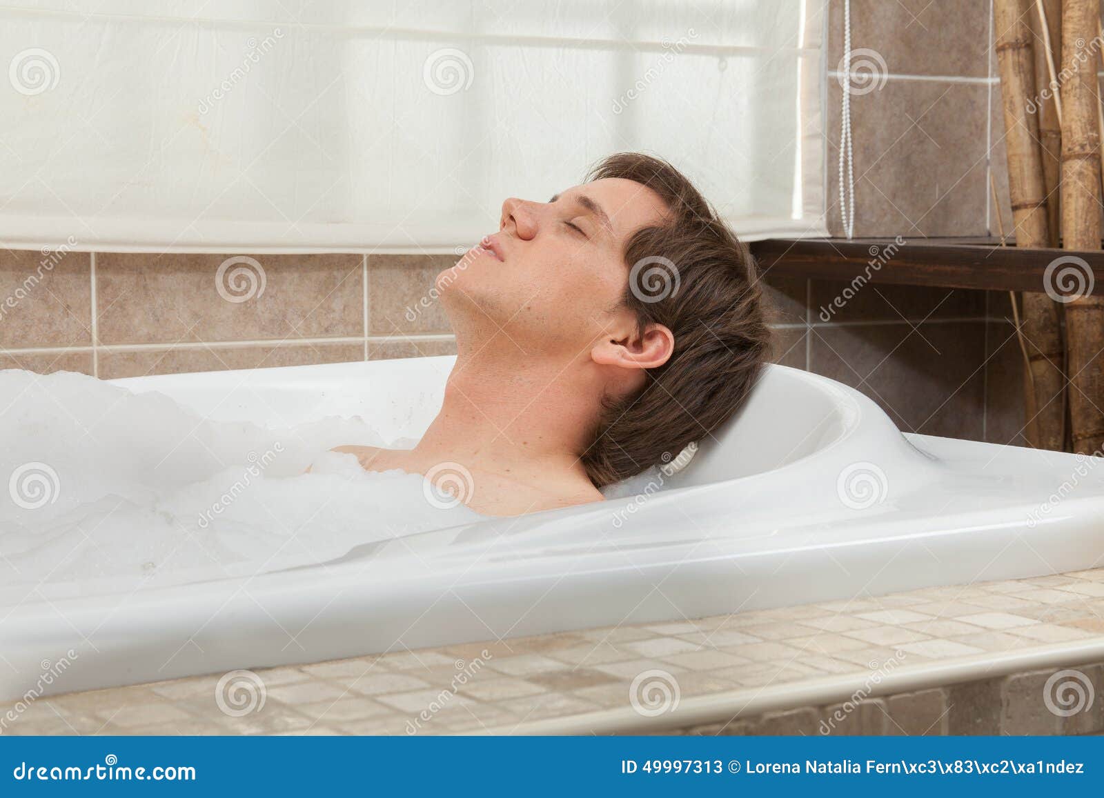Man relaxed in the tub stock image. Image of pretty, bathtub - 49997313