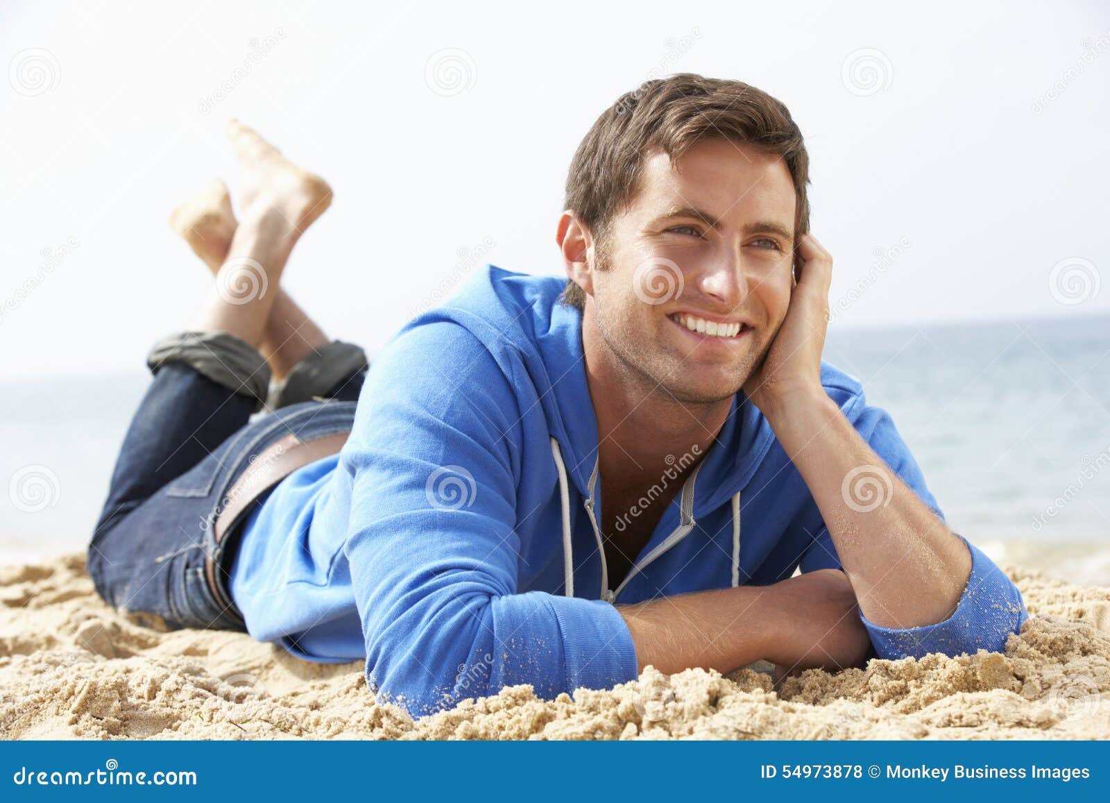 Man Relaxing on Beach stock photo. Image of beach, autumn - 54973878