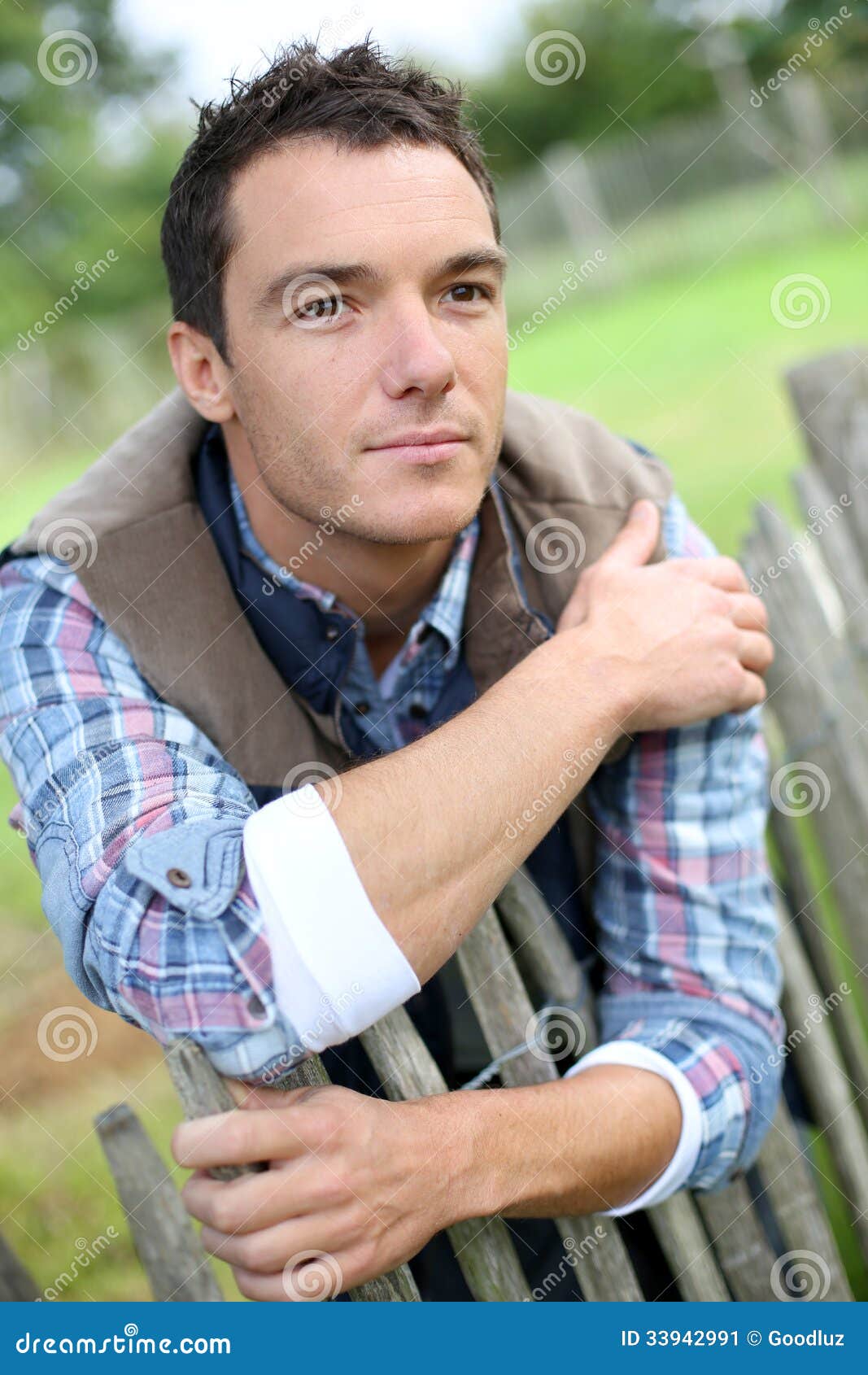 Man Relaxing in Countryside Stock Image - Image of standing, serenity ...