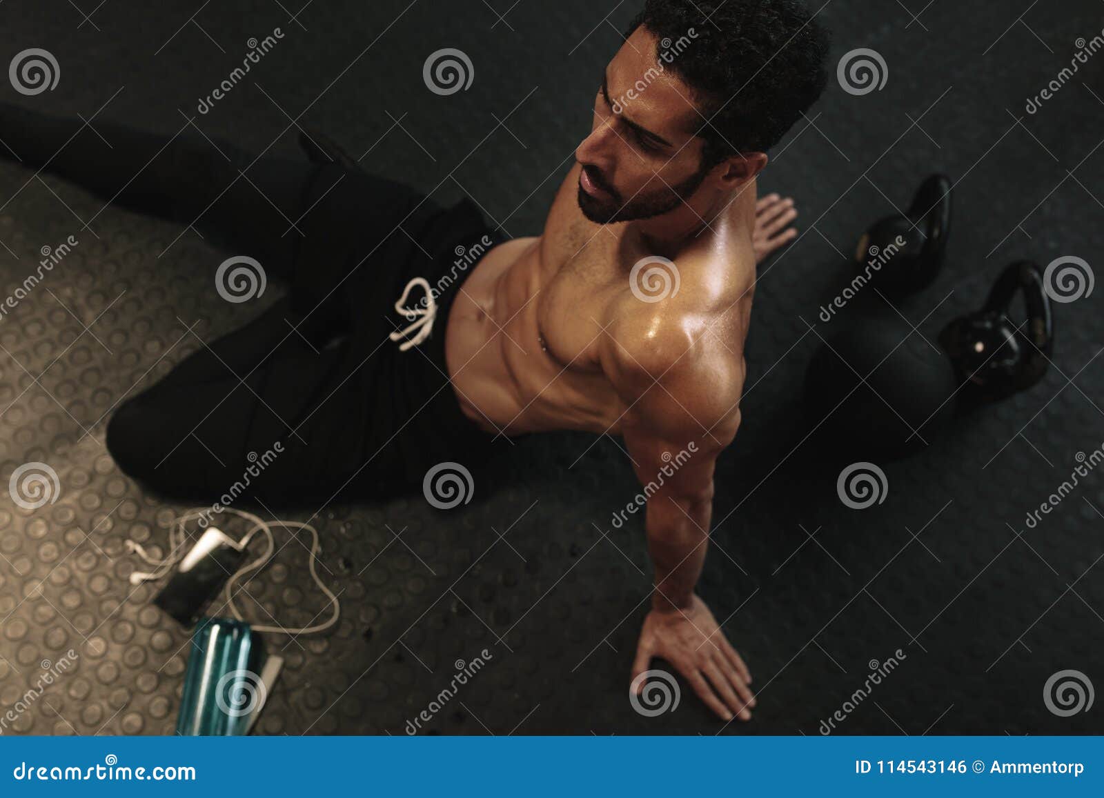Man Relaxing on Floor after Training Stock Photo - Image of view ...