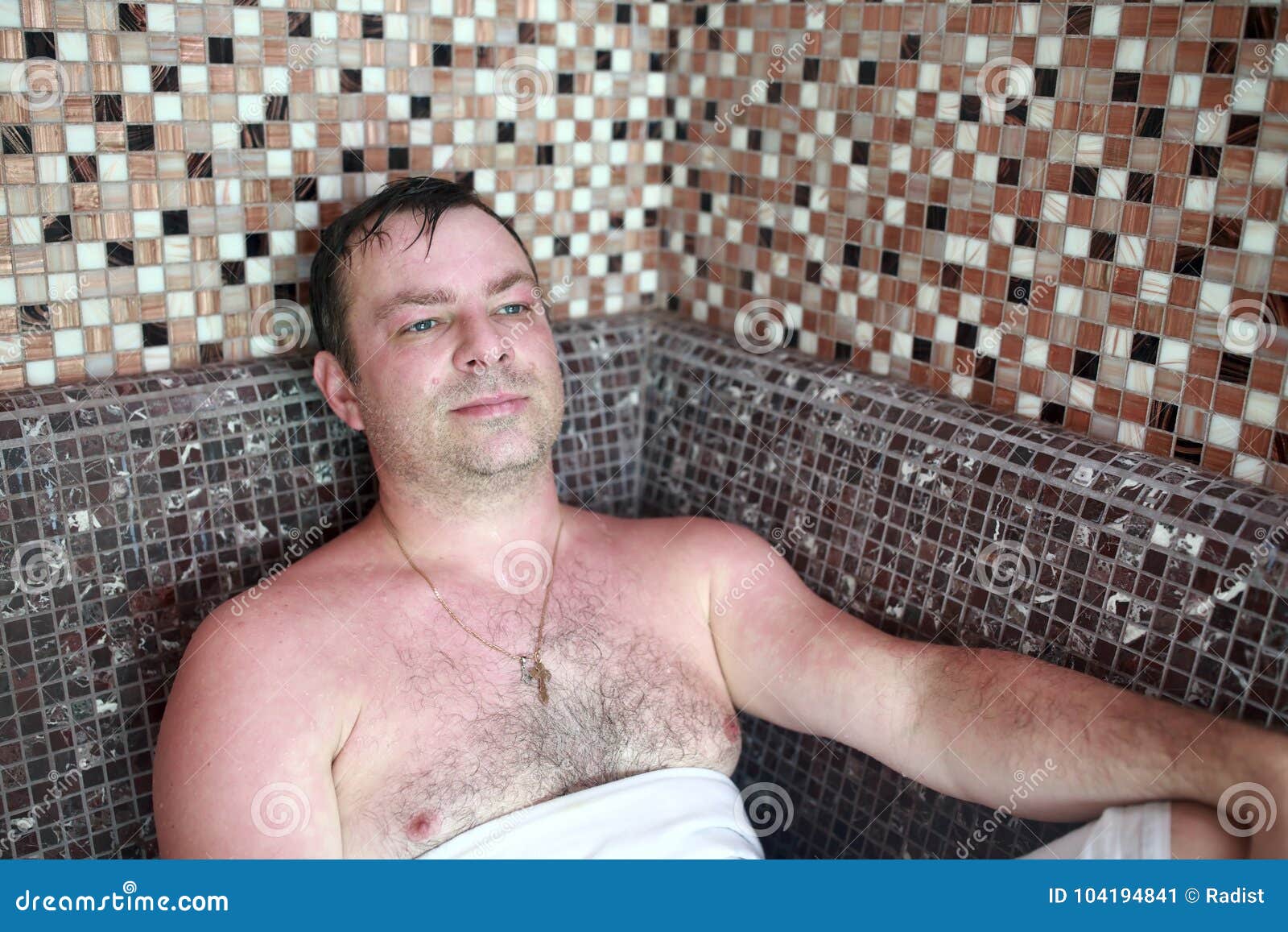 Man relaxing in hammam stock image. Image of interior - 104194841