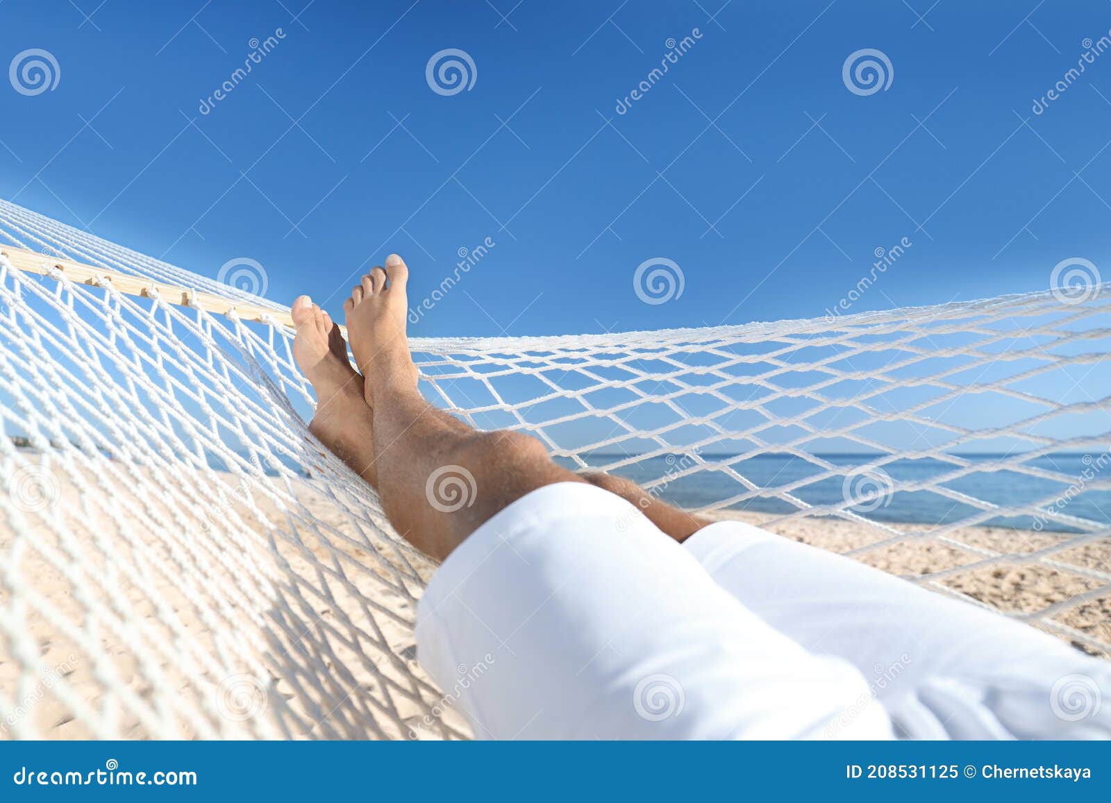Man Relaxing in Hammock on Beach, Closeup Stock Image - Image of luxury ...