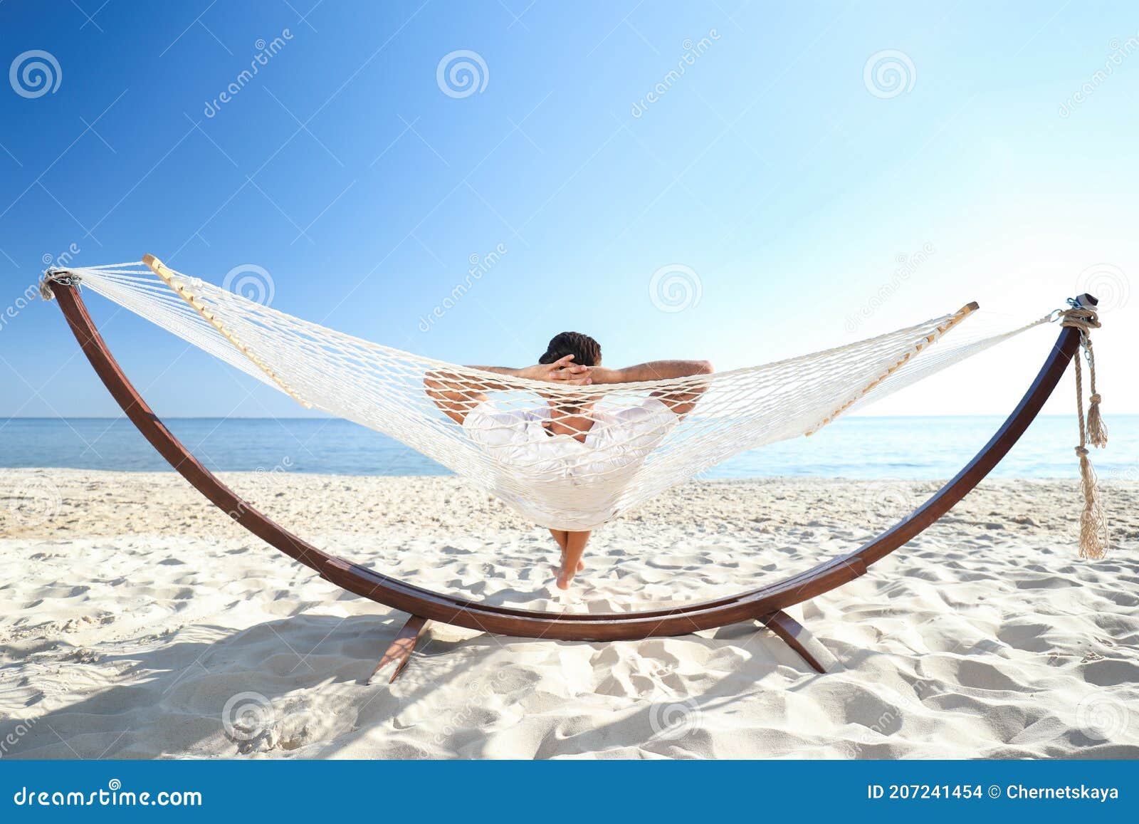 Man Relaxing in Hammock on Beach. Summer Vacation Stock Photo - Image ...