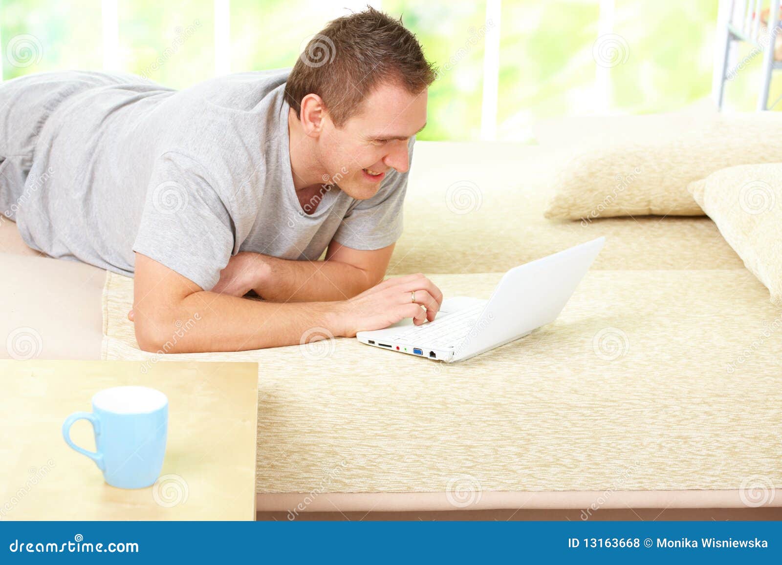 Man relaxing with laptop stock photo. Image of head, computer - 13163668