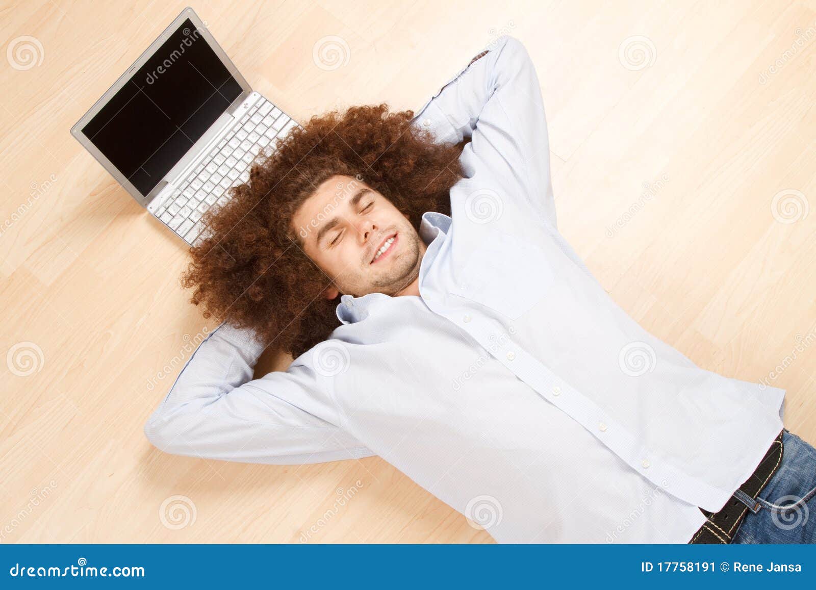 Man Relaxing with Laptop stock image. Image of smile - 17758191