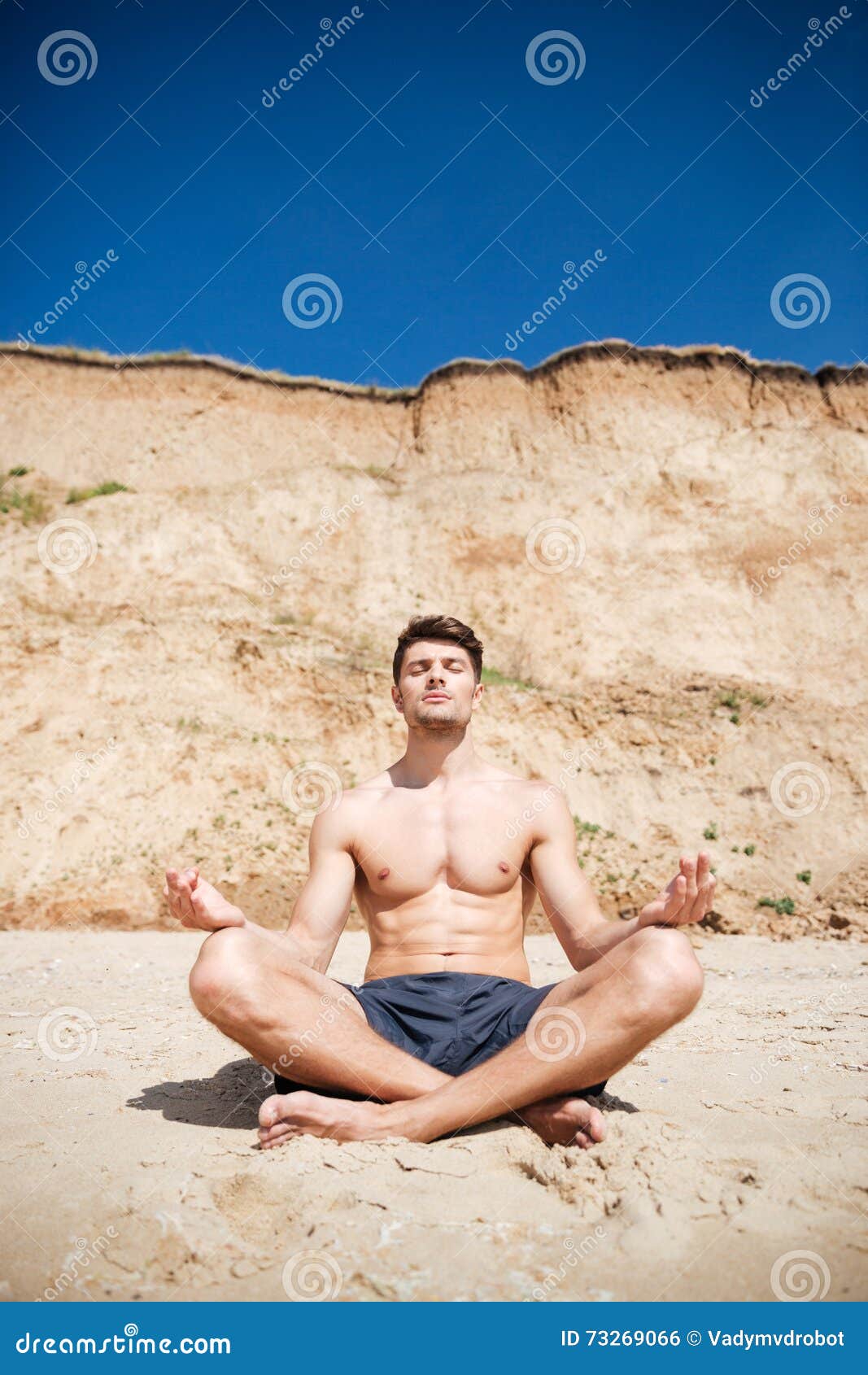 Man Relaxing and Meditating on the Beach Stock Photo - Image of beach ...
