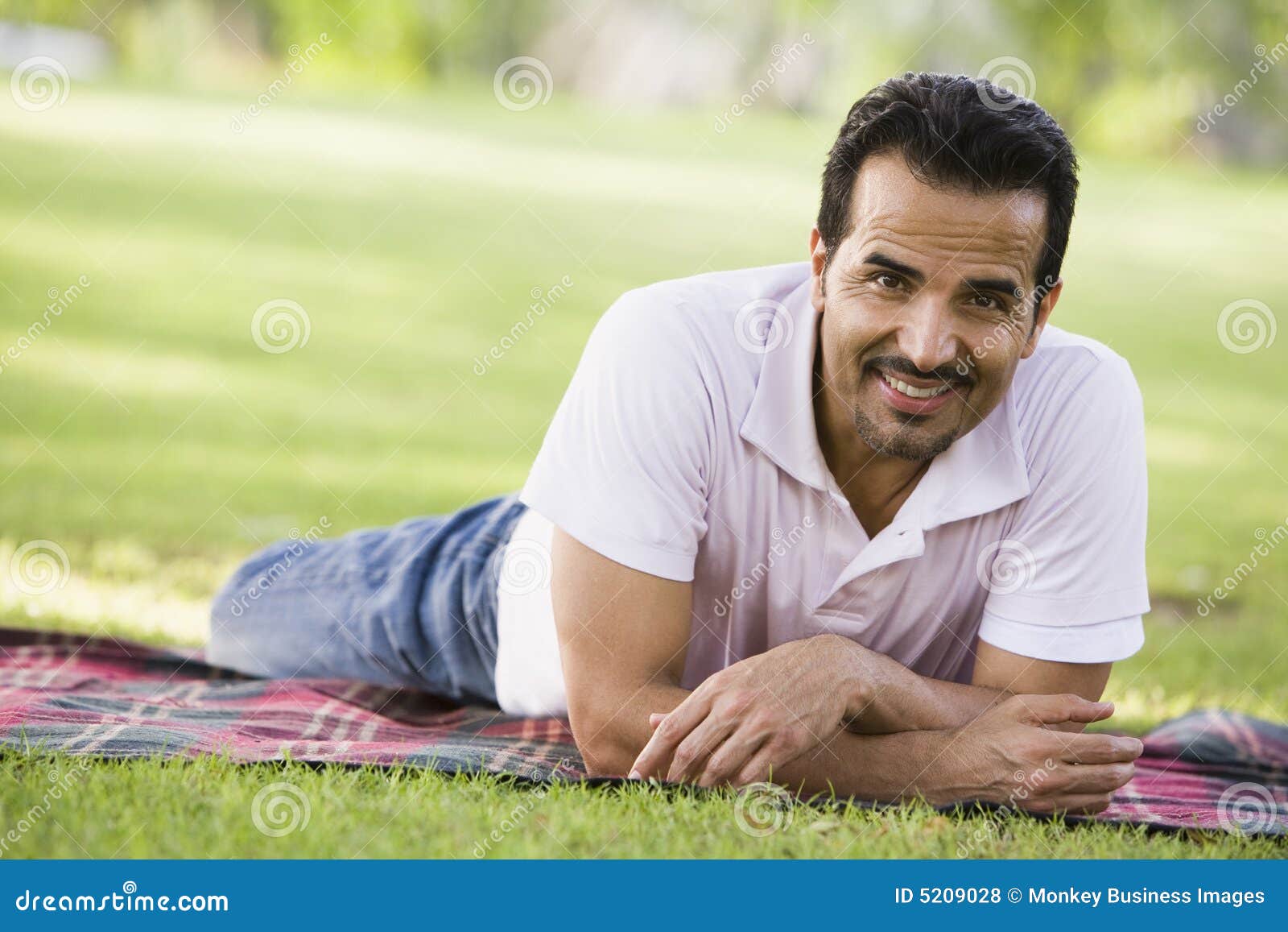 Man relaxing in park stock photo. Image of space, young - 5209028