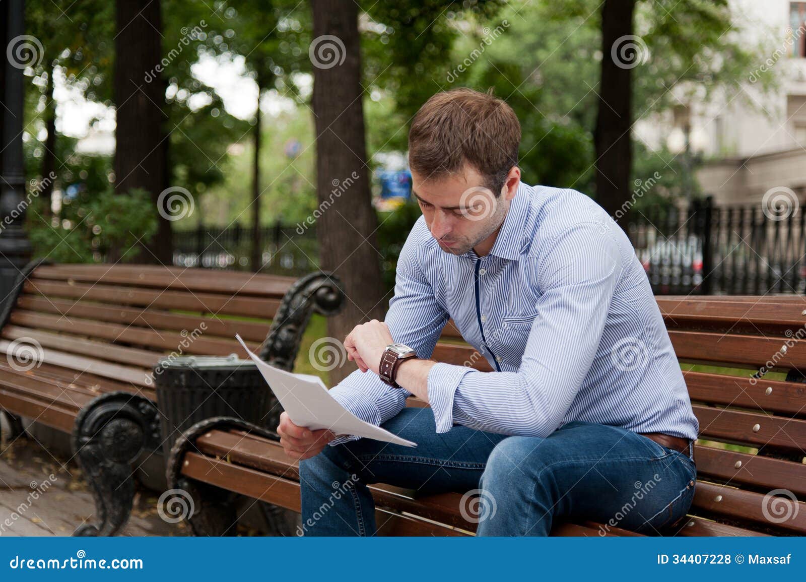 Man Relaxing in the Public Garden Stock Photo - Image of green, read ...