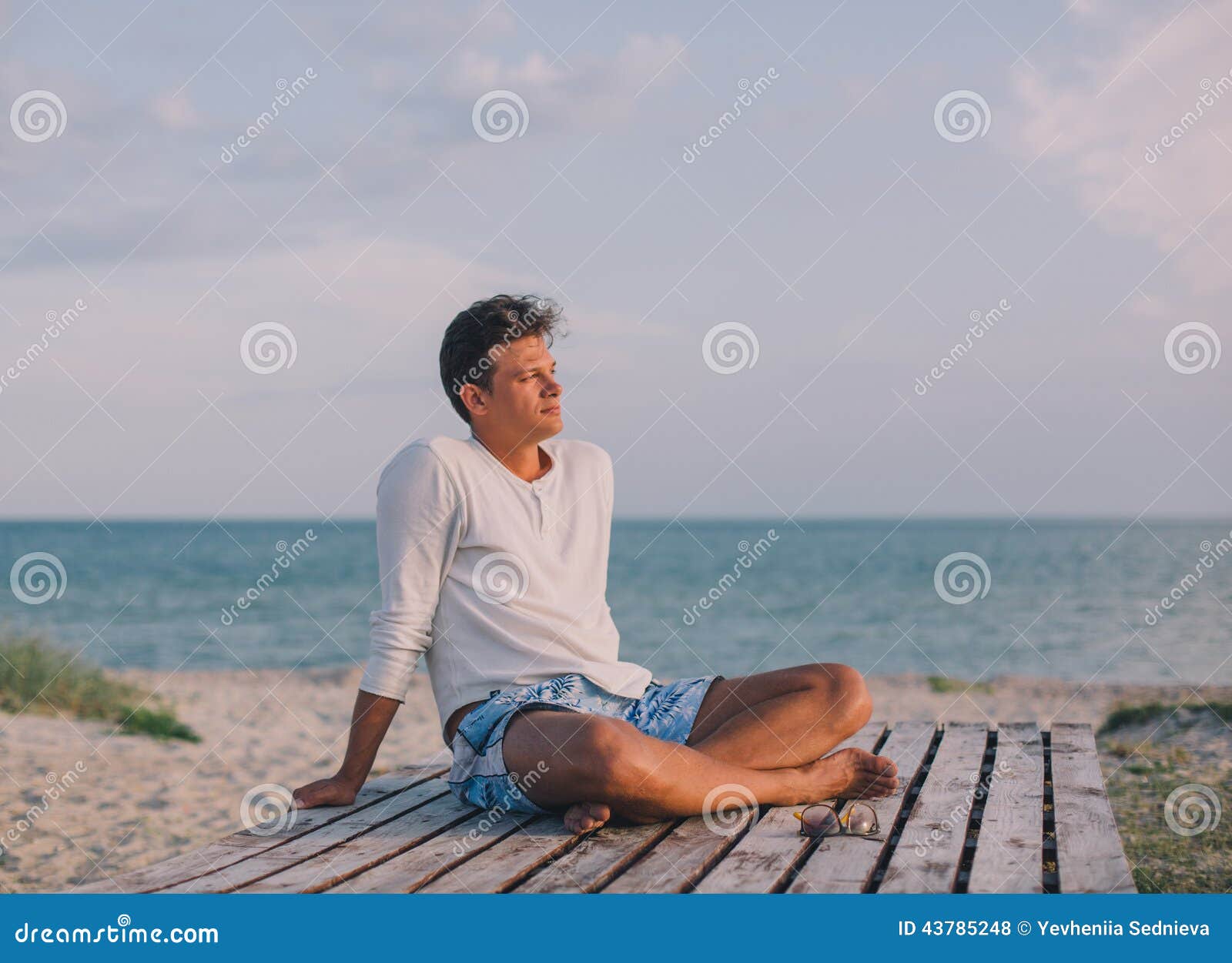 Man Relaxing at the Sea Beach Stock Photo - Image of nature, beach ...
